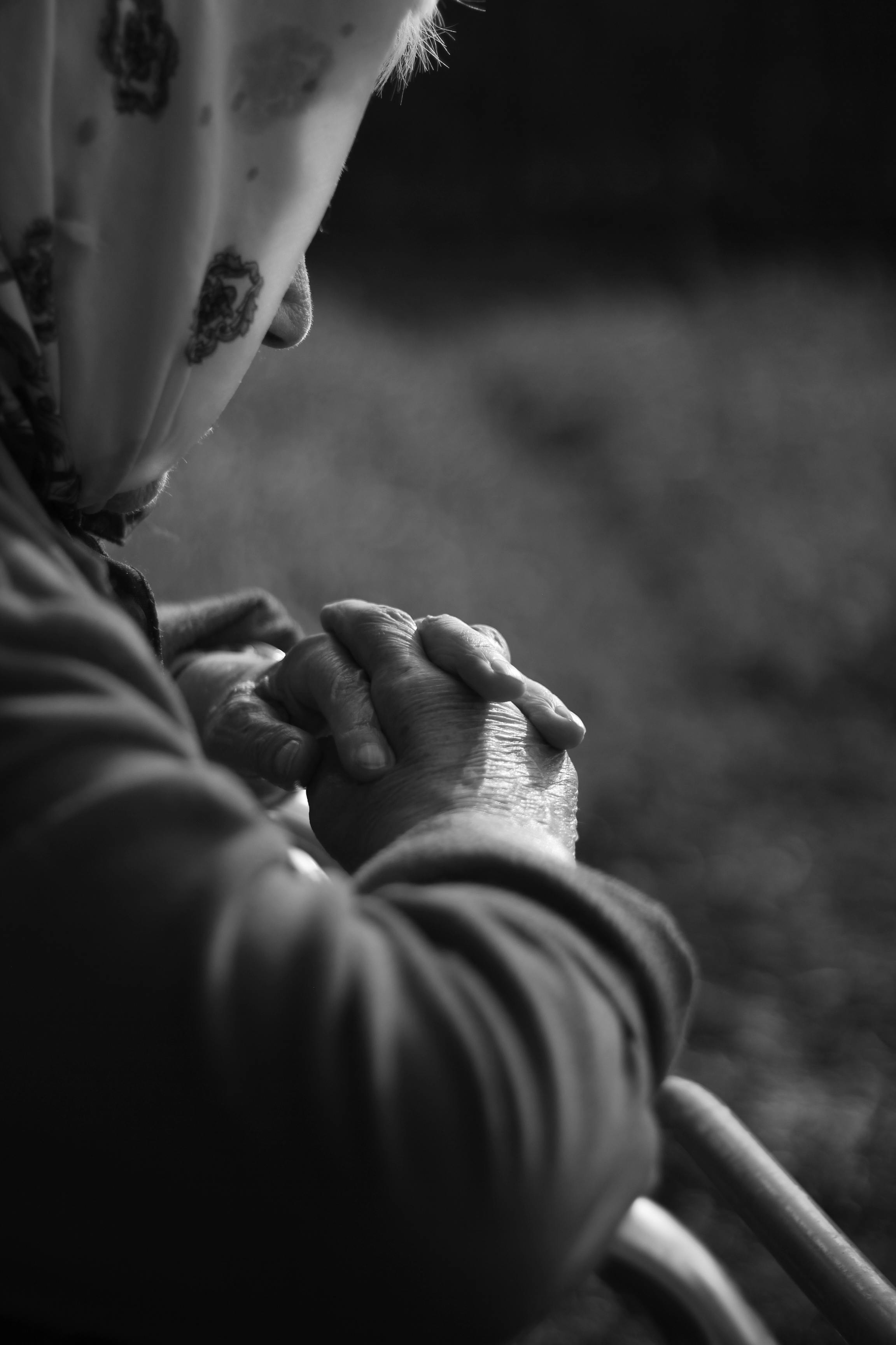 Grayscale Photo of Man Holding Tools · Free Stock Photo