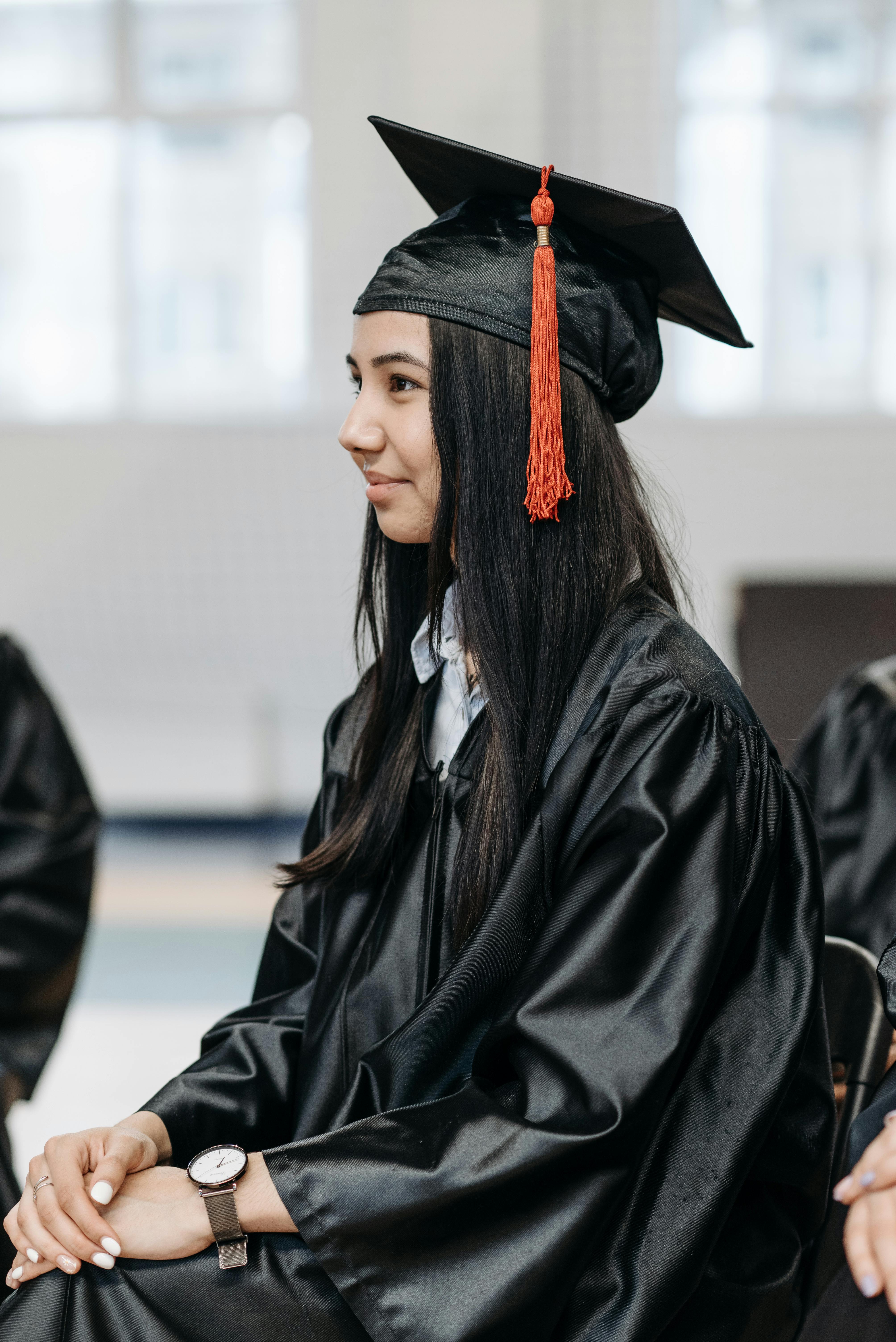 A Group of Person Holding Graduation Cap · Free Stock Photo