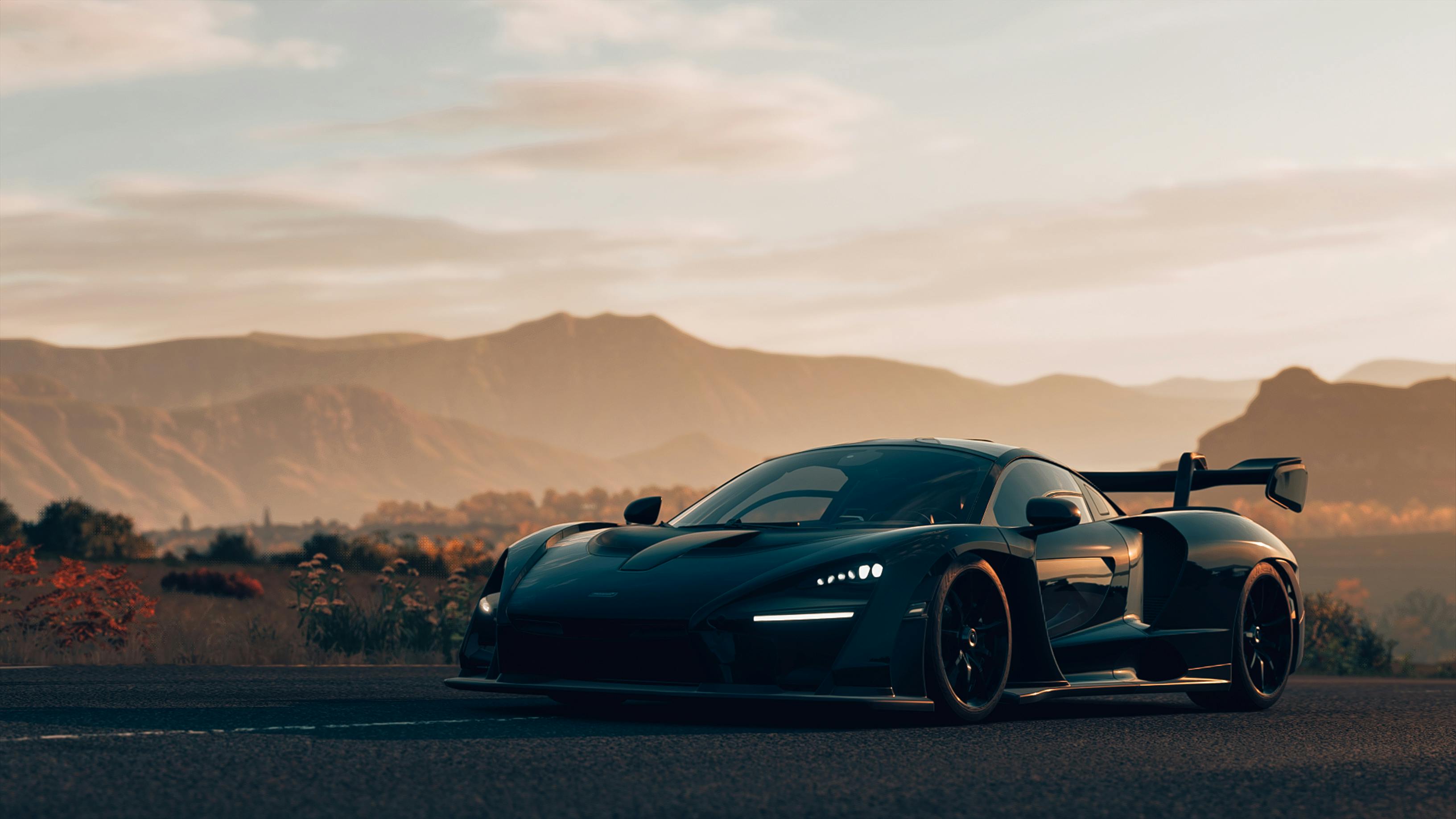 Black Sports Car on Asphalt Road · Free Stock Photo