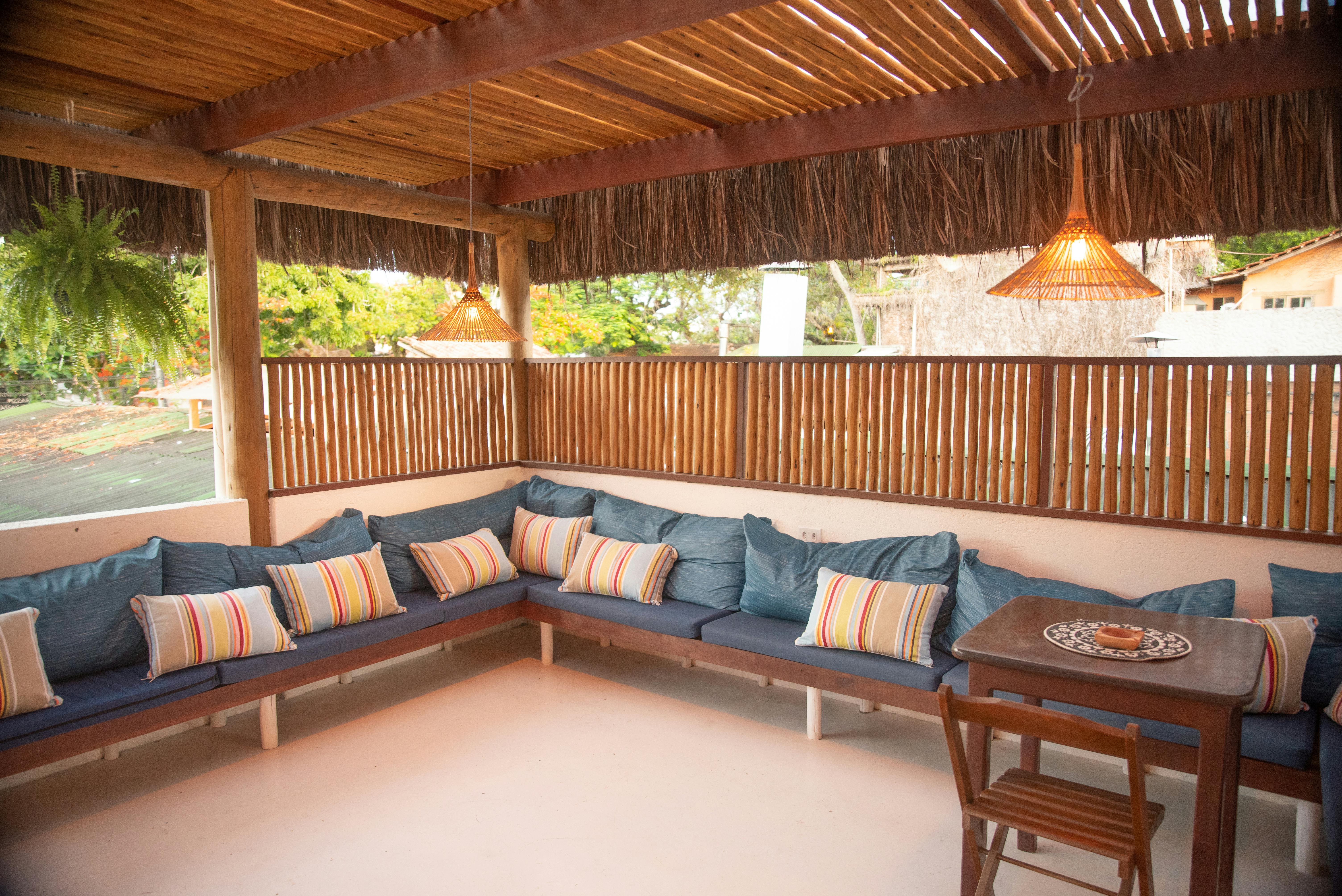 Straw Roof over Cozy Terrace of Cafe · Free Stock Photo
