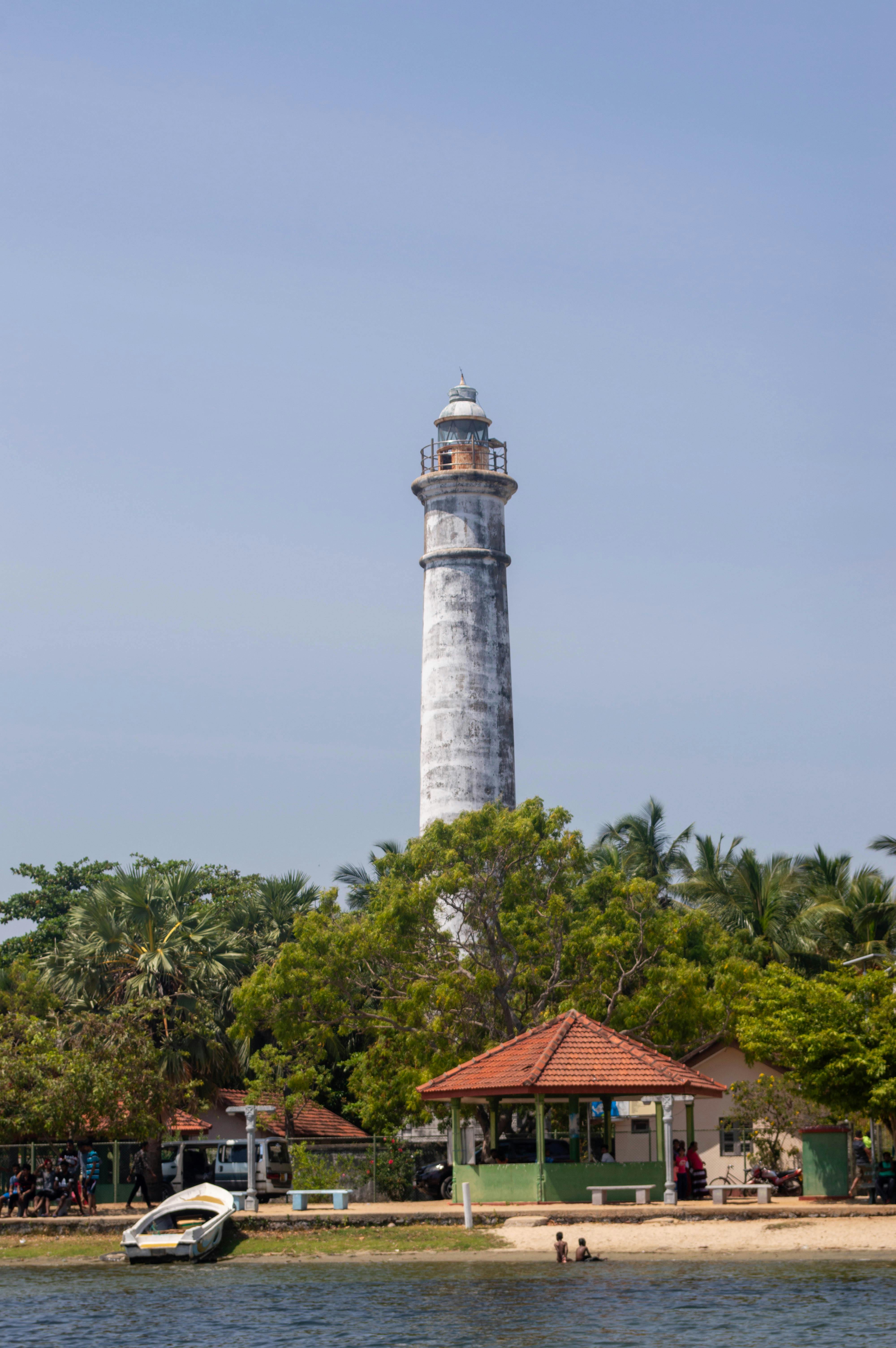 Lighthouse Tower Under Purple Sky · Free Stock Photo
