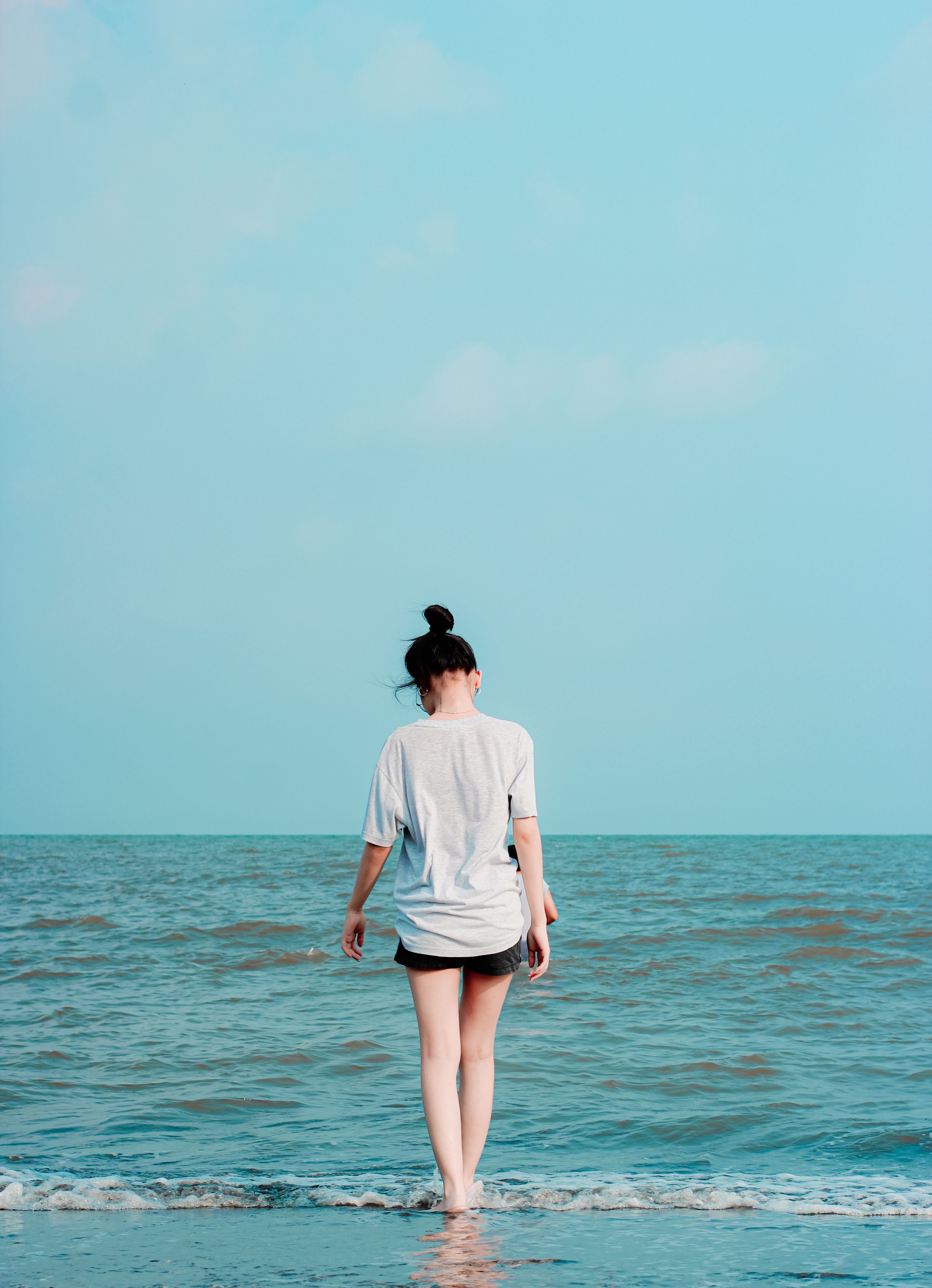 A Tired Woman on a Beach · Free Stock Photo