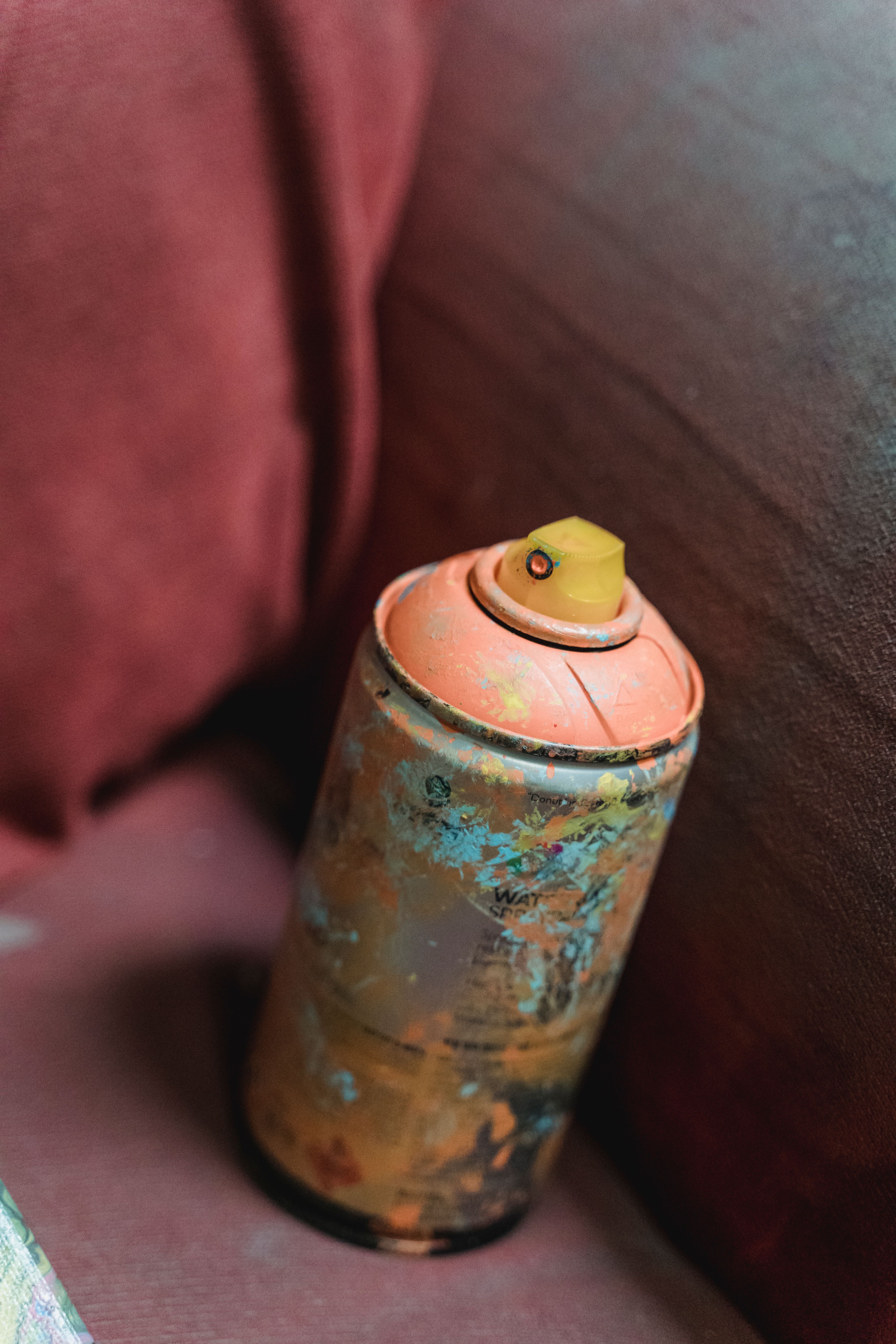 Orange Spray Paint in Close Up Shot · Free Stock Photo