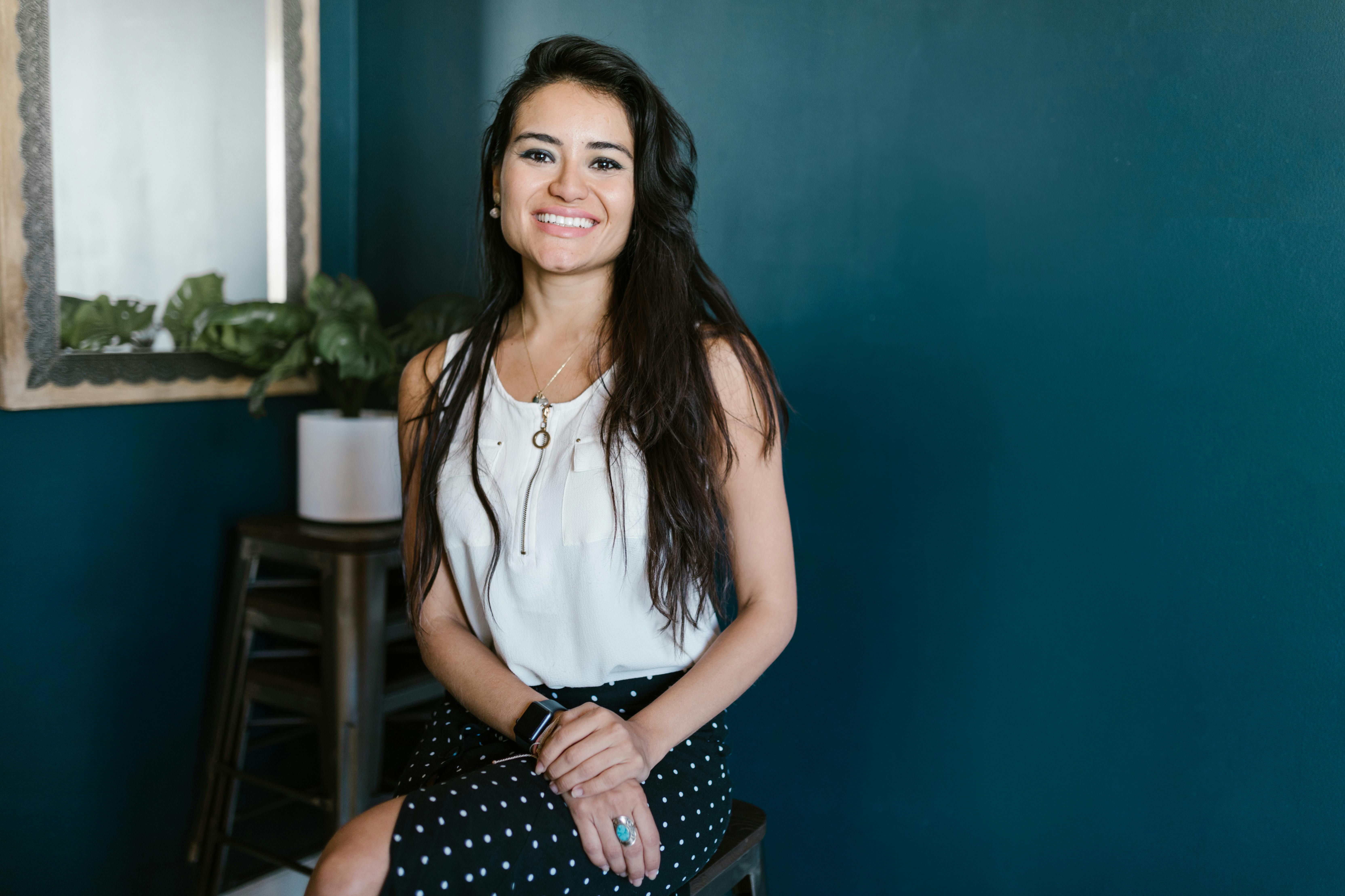 A Beautiful Woman Behind a Glass Panel · Free Stock Photo
