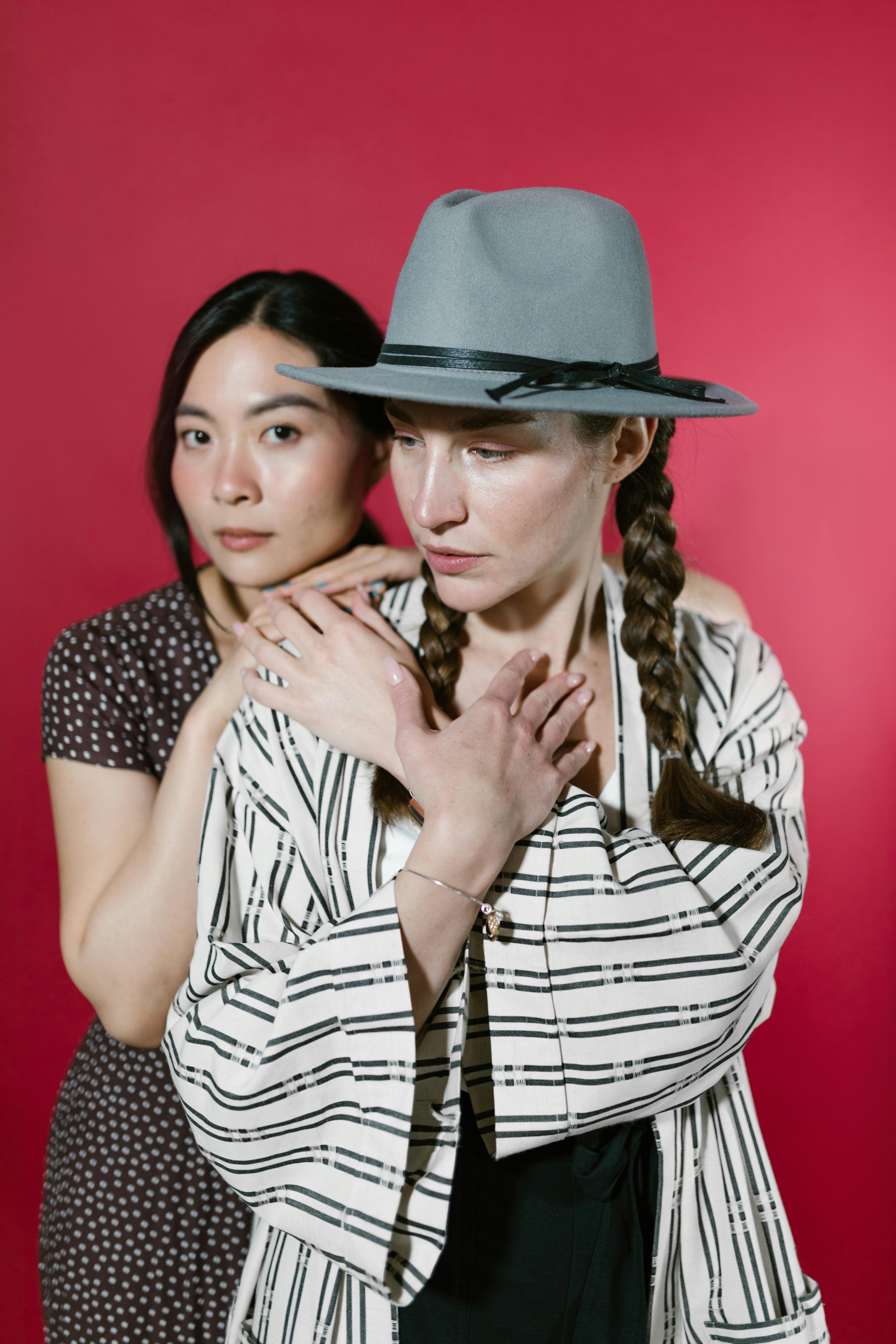 Women Posing with Hands on Cheeks · Free Stock Photo