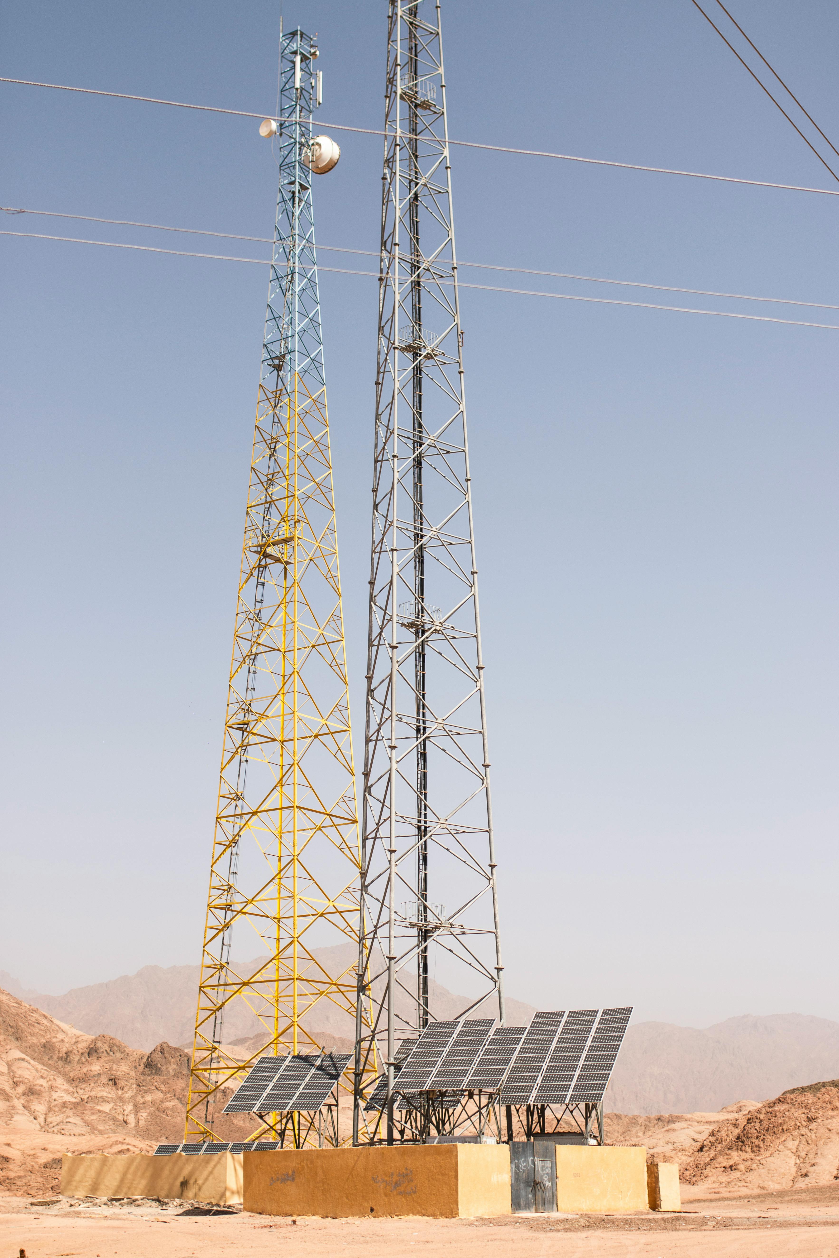 Transmission Towers and Solar Panels · Free Stock Photo
