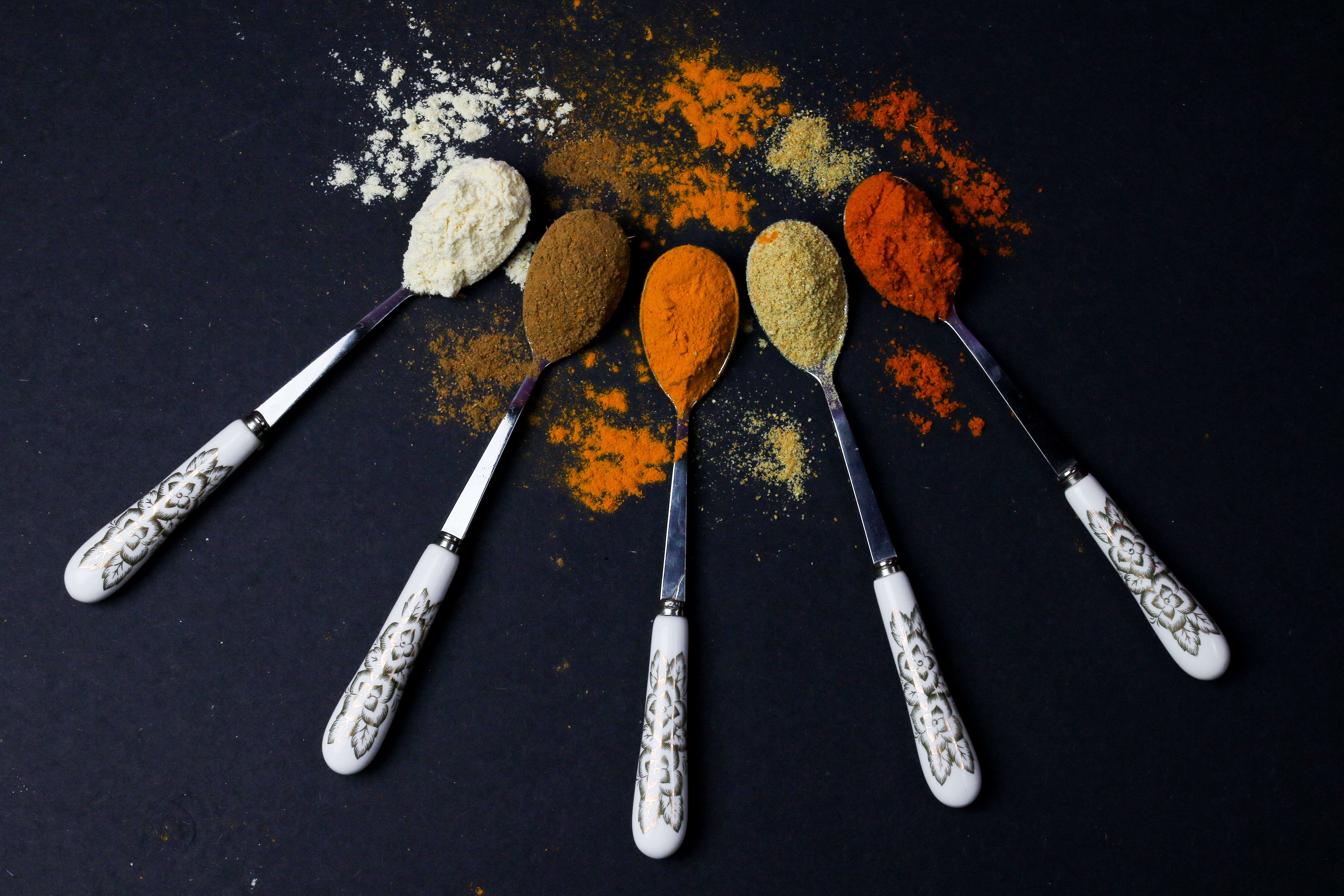 Composition of Spoonfuls with Various Spices · Free Stock Photo