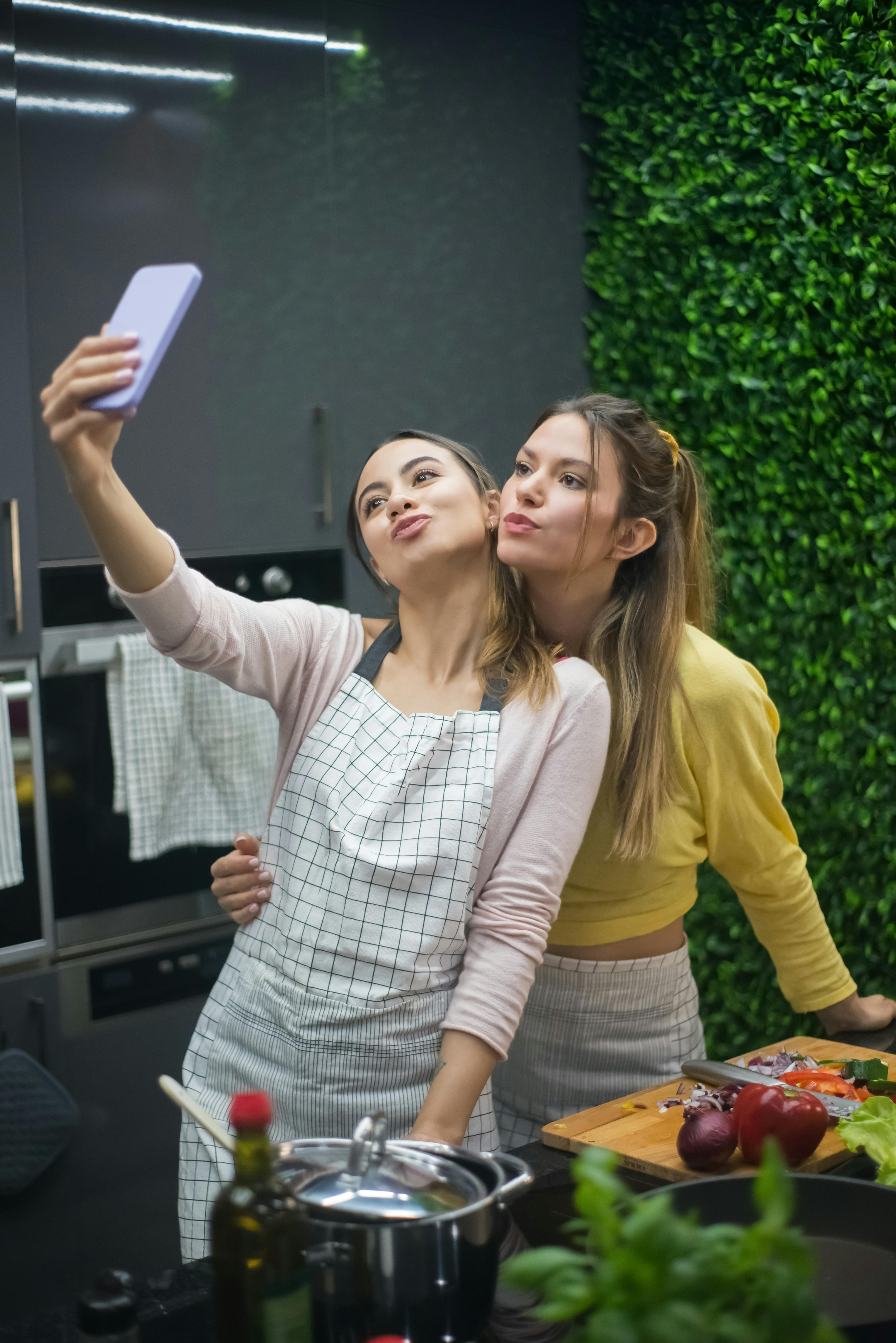Affectionate Women in the Kitchen · Free Stock Photo