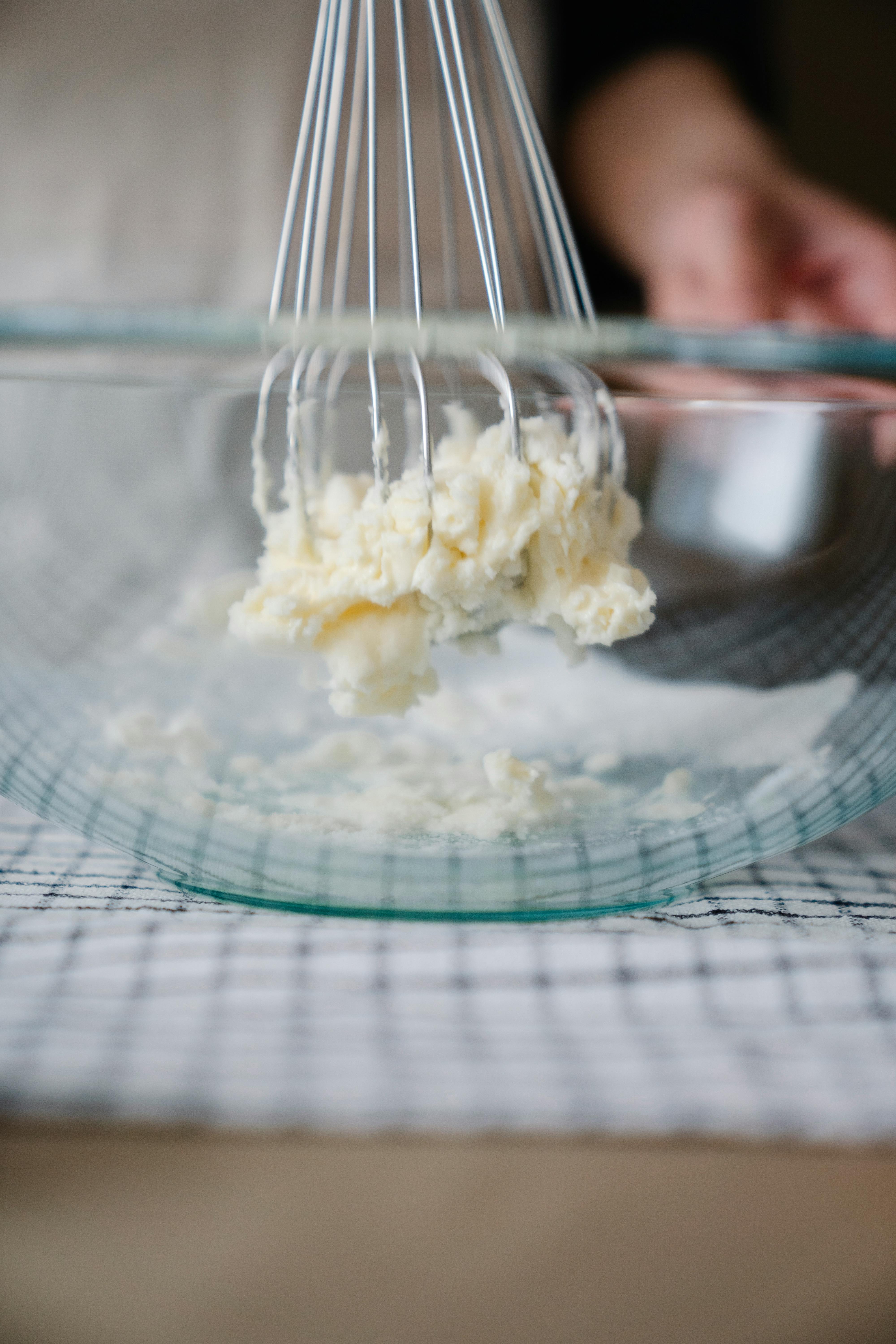 Female mixing ingredients in bowl with whisk · Free Stock Photo
