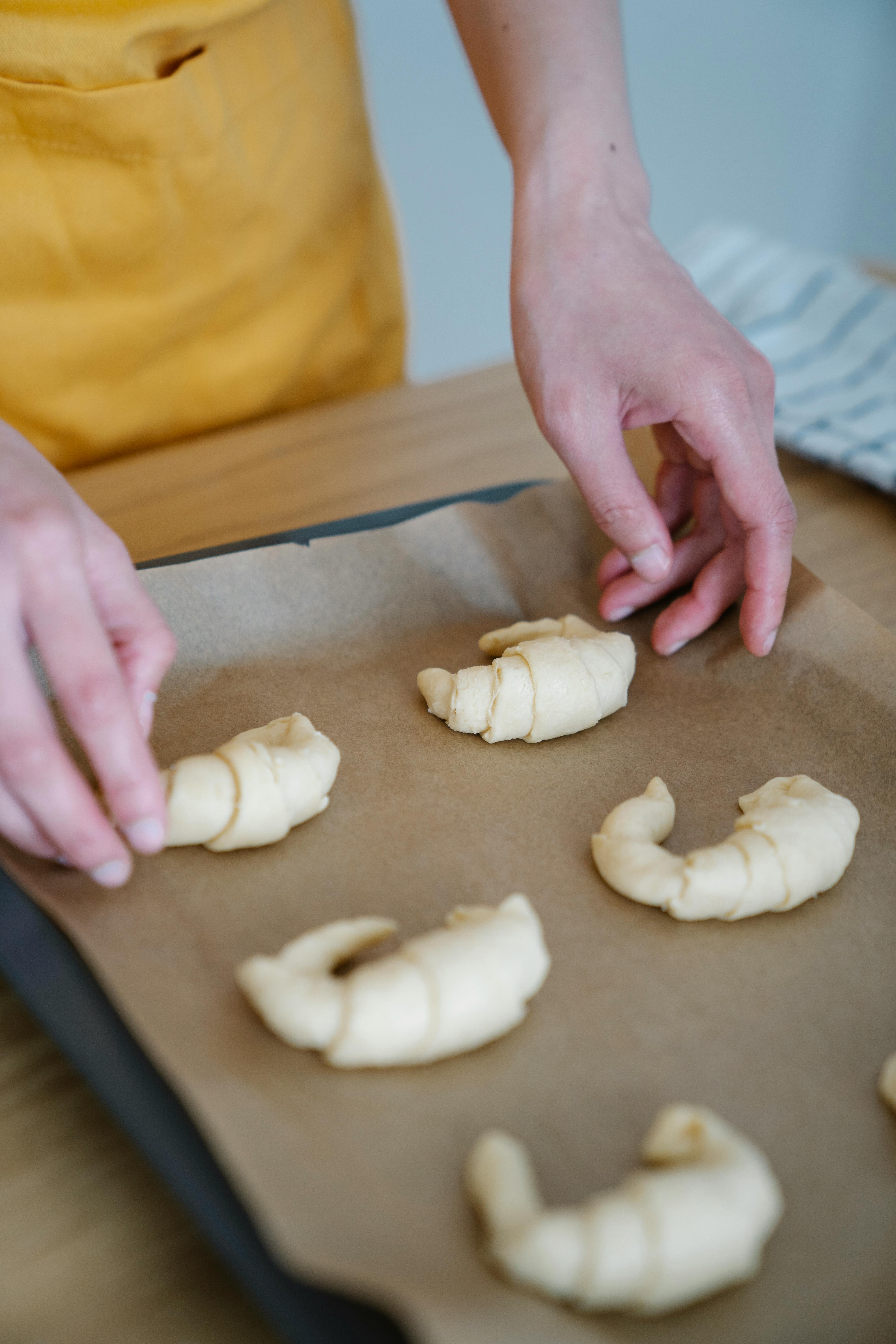 A Pastry Chef Making Croissants · Free Stock Photo