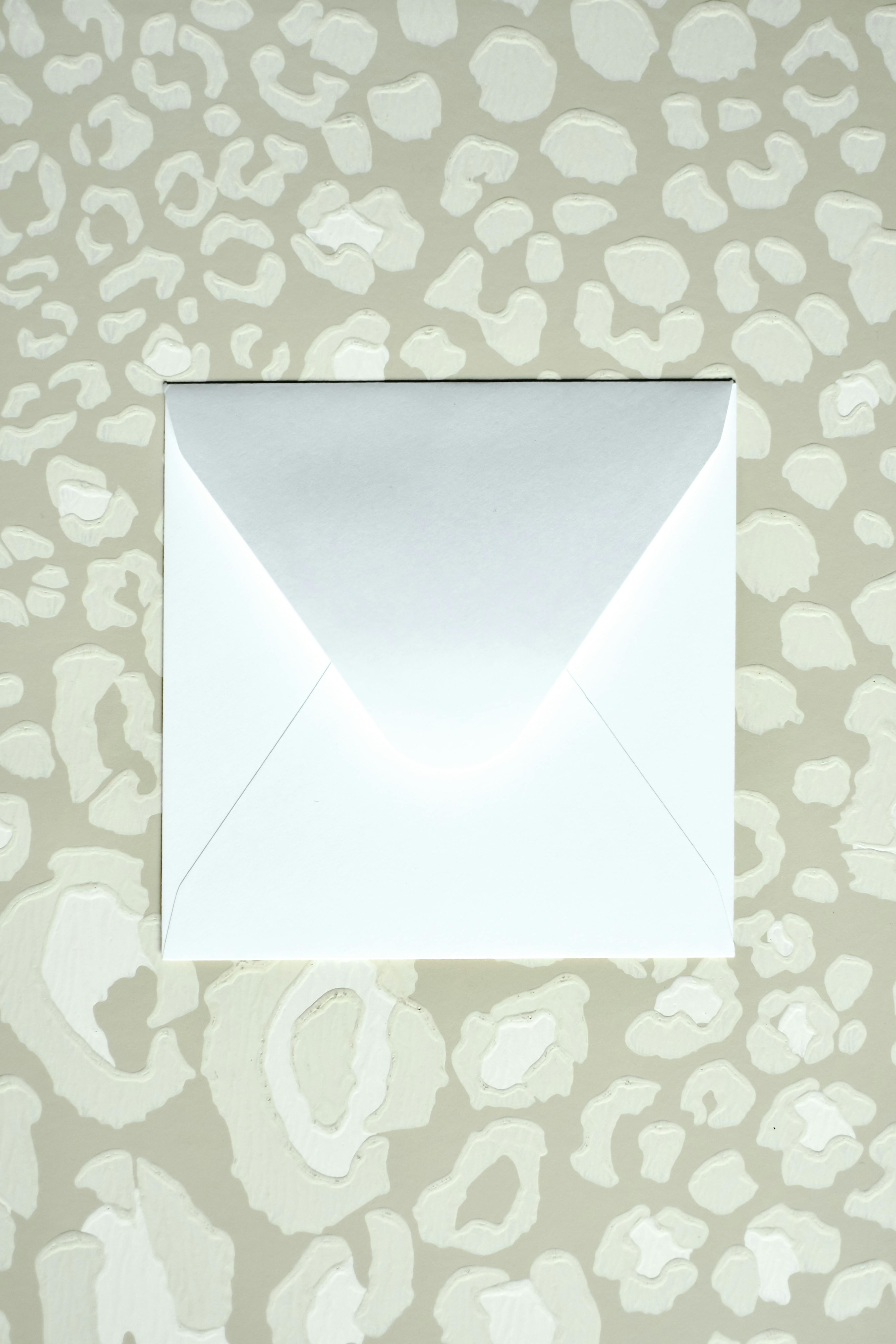 White Envelope on Pattern Background · Free Stock Photo