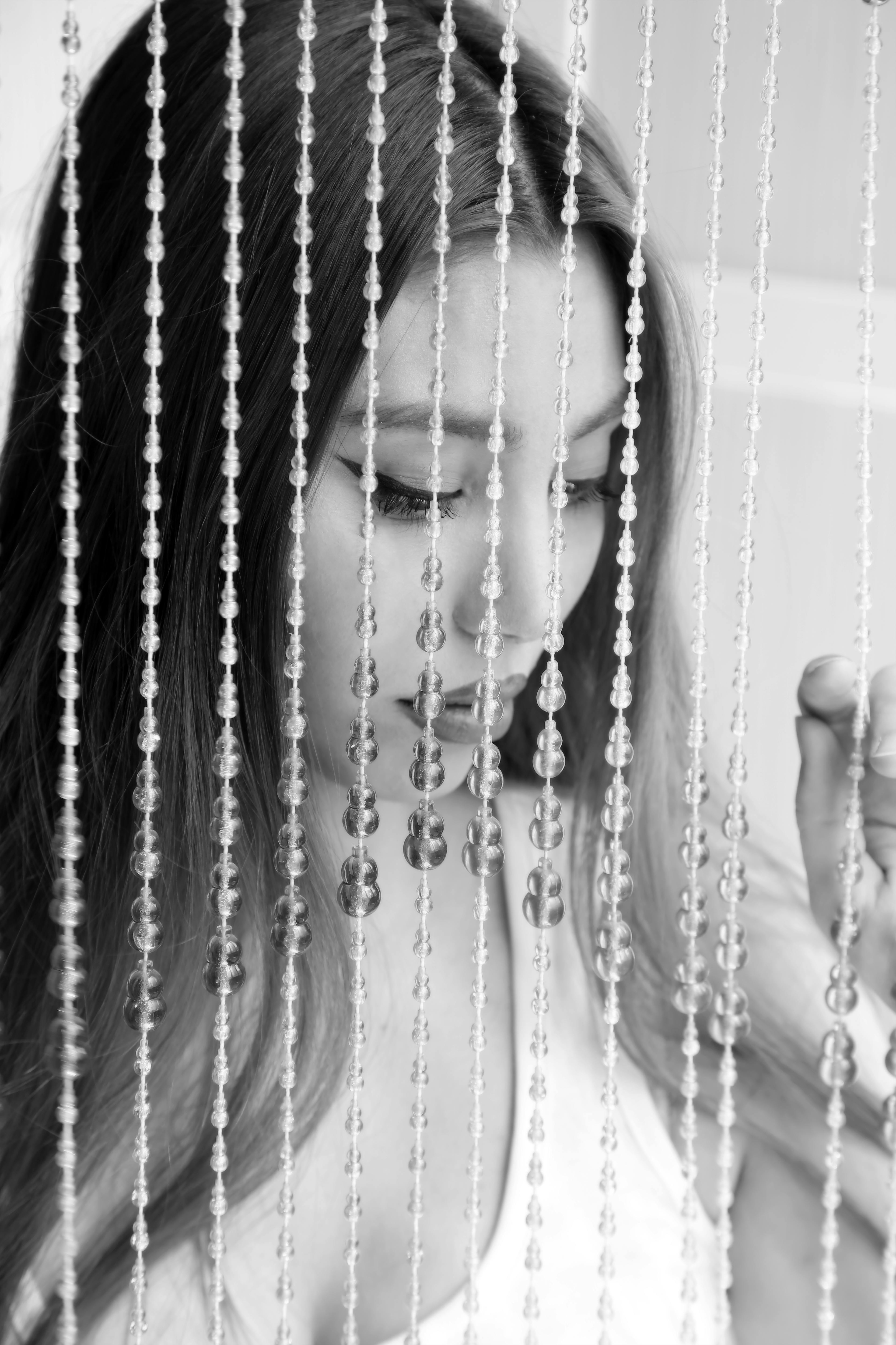 A White String Between Two Golden Rings · Free Stock Photo