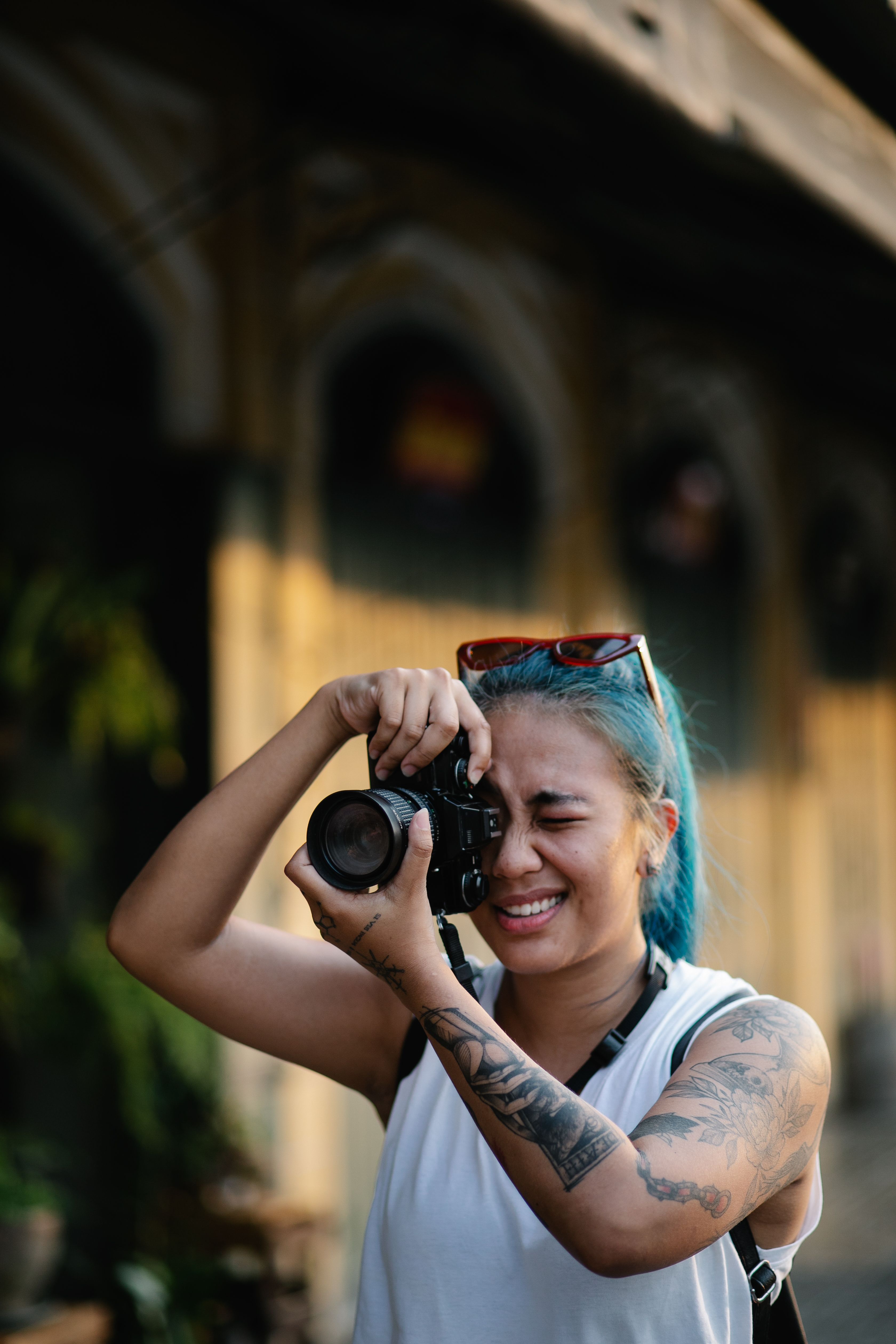 Grayscale Photo of Woman Using Dslr Camera · Free Stock Photo