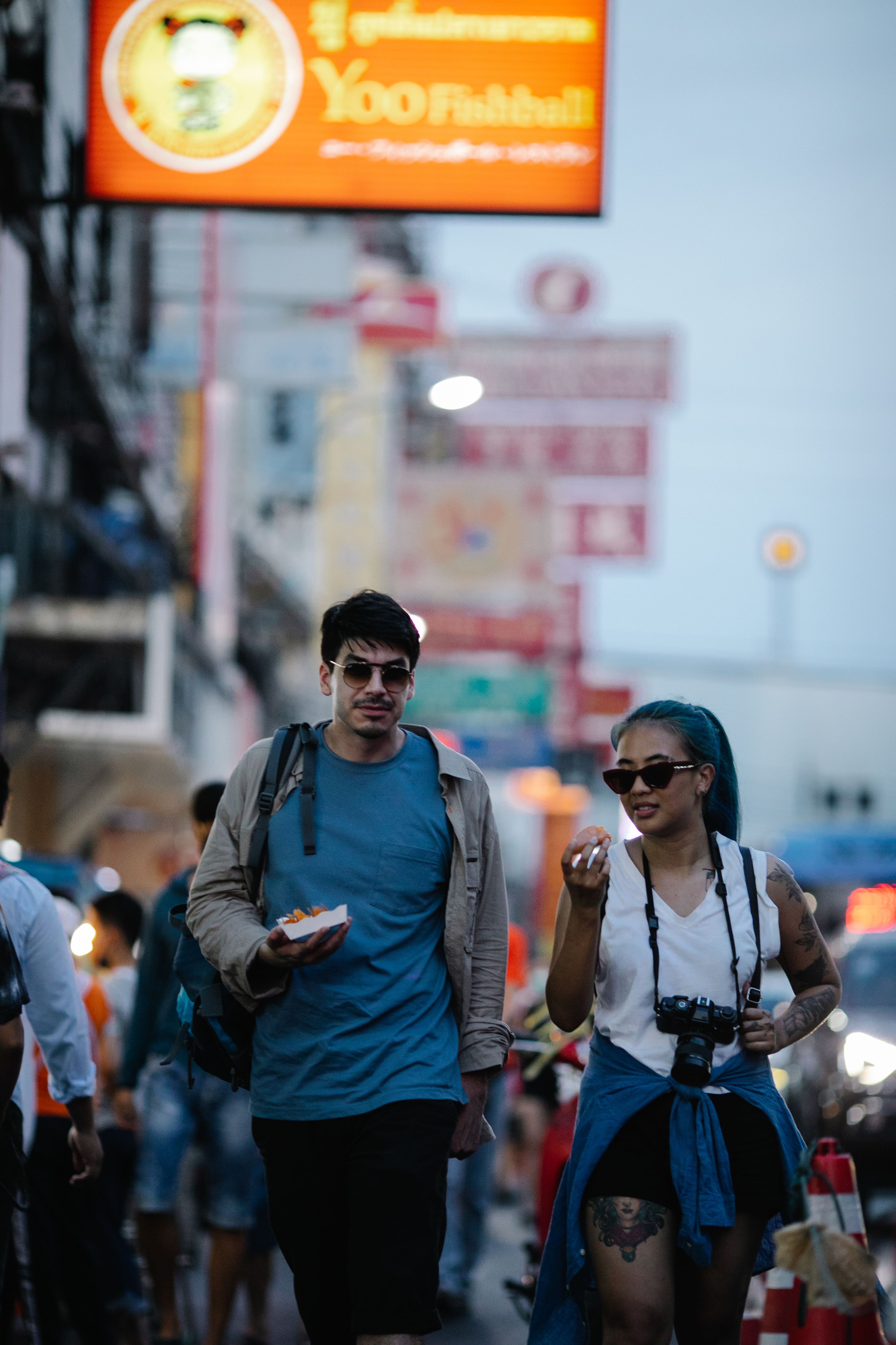 Woman Eating While Walking · Free Stock Photo