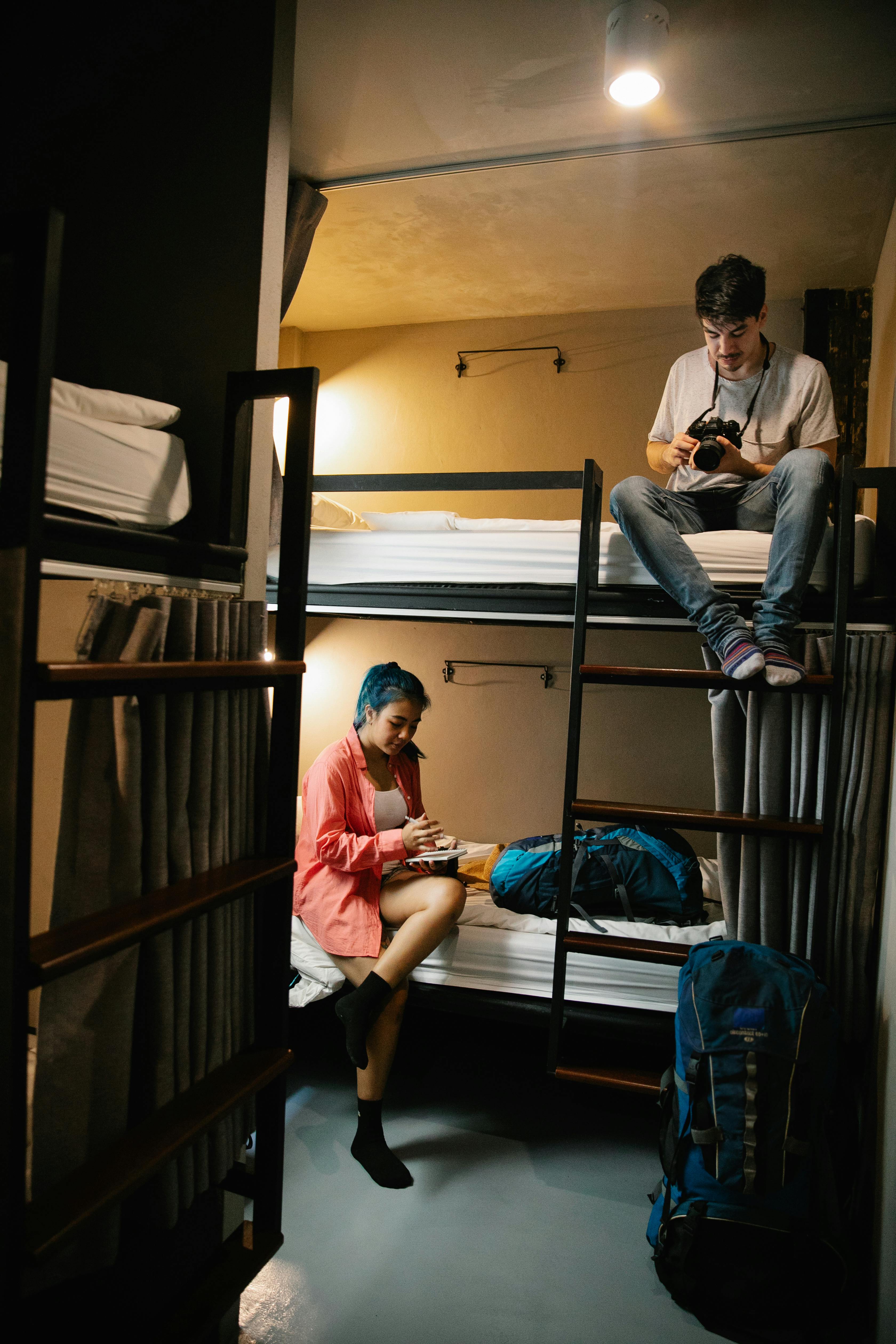 Woman Prepare To Stay in Hostel · Free Stock Photo