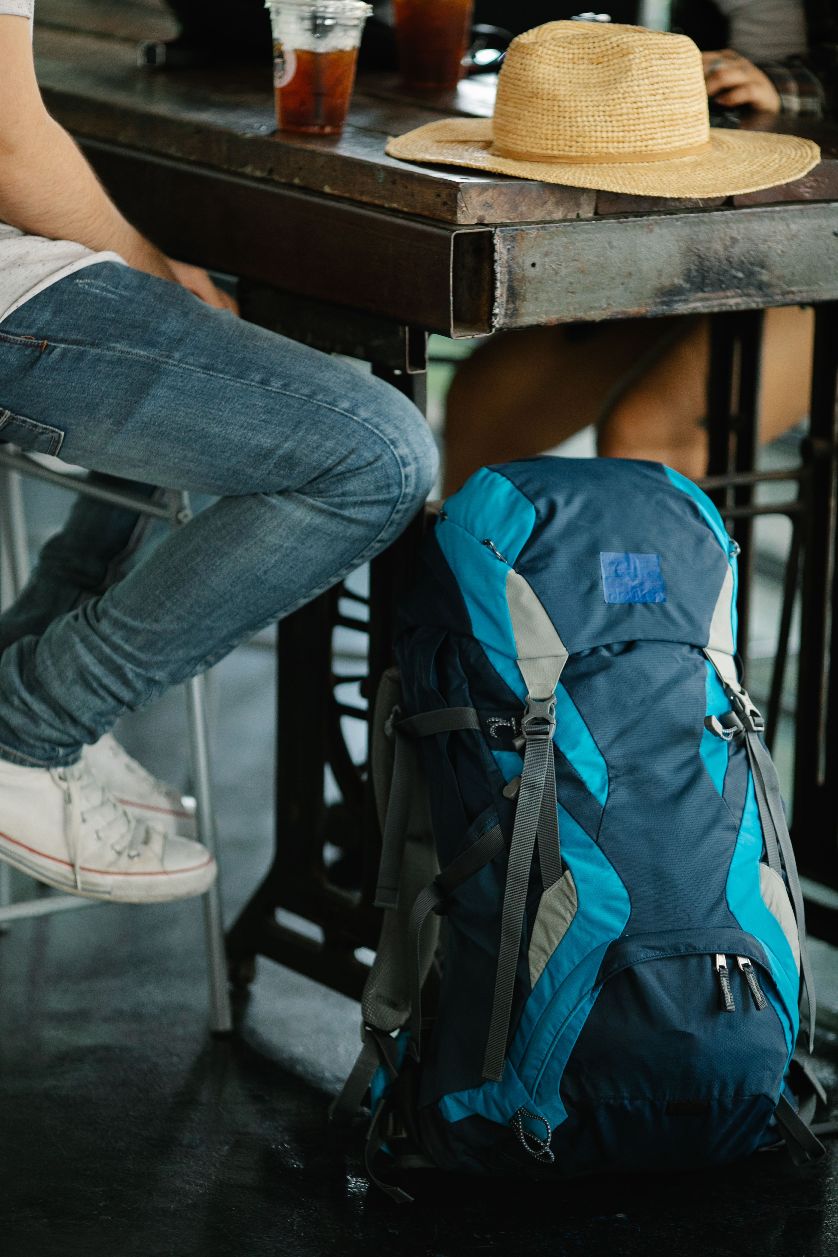 Backpack near Legs · Free Stock Photo