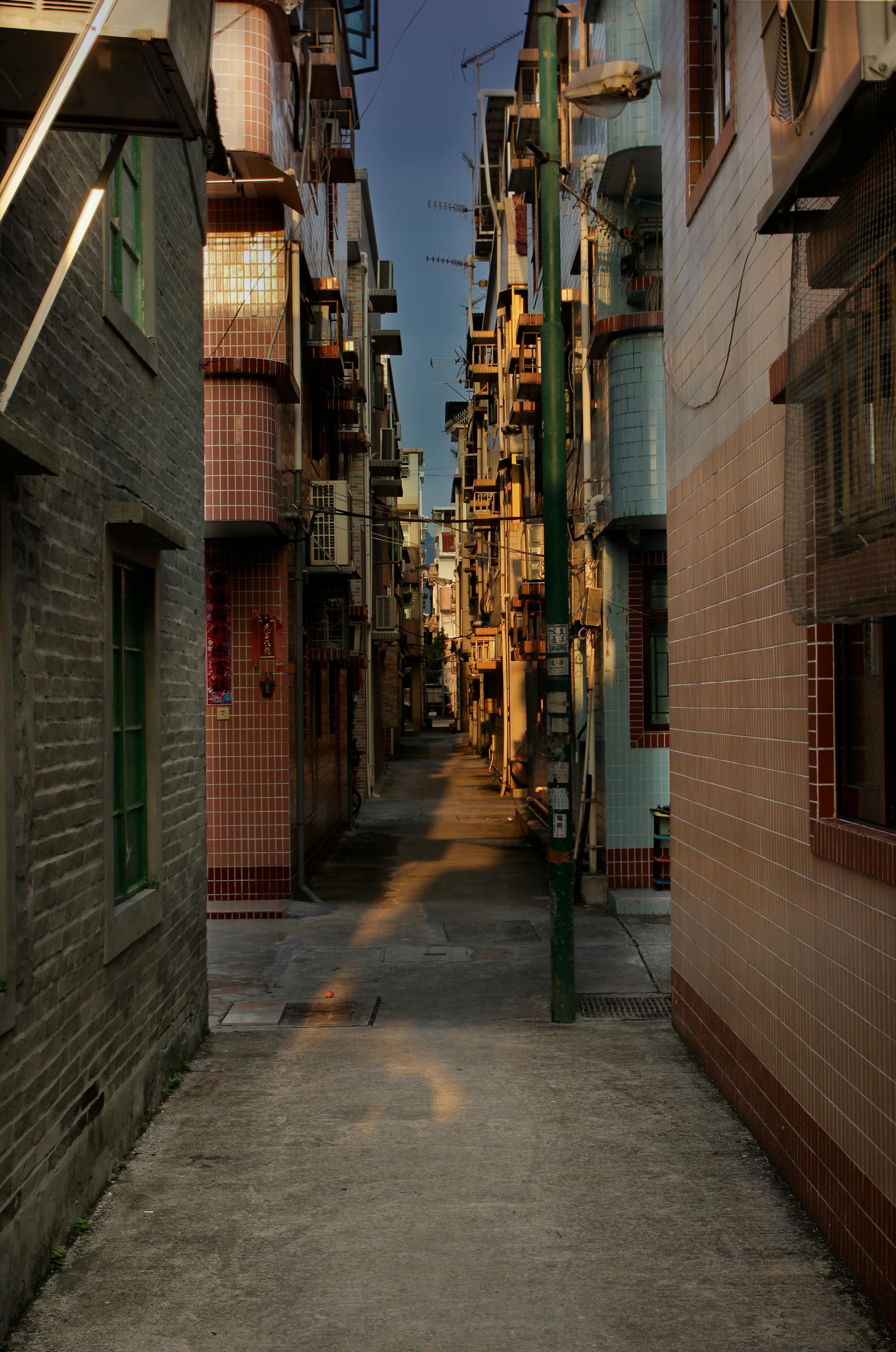 An Empty Alley between Buildings · Free Stock Photo