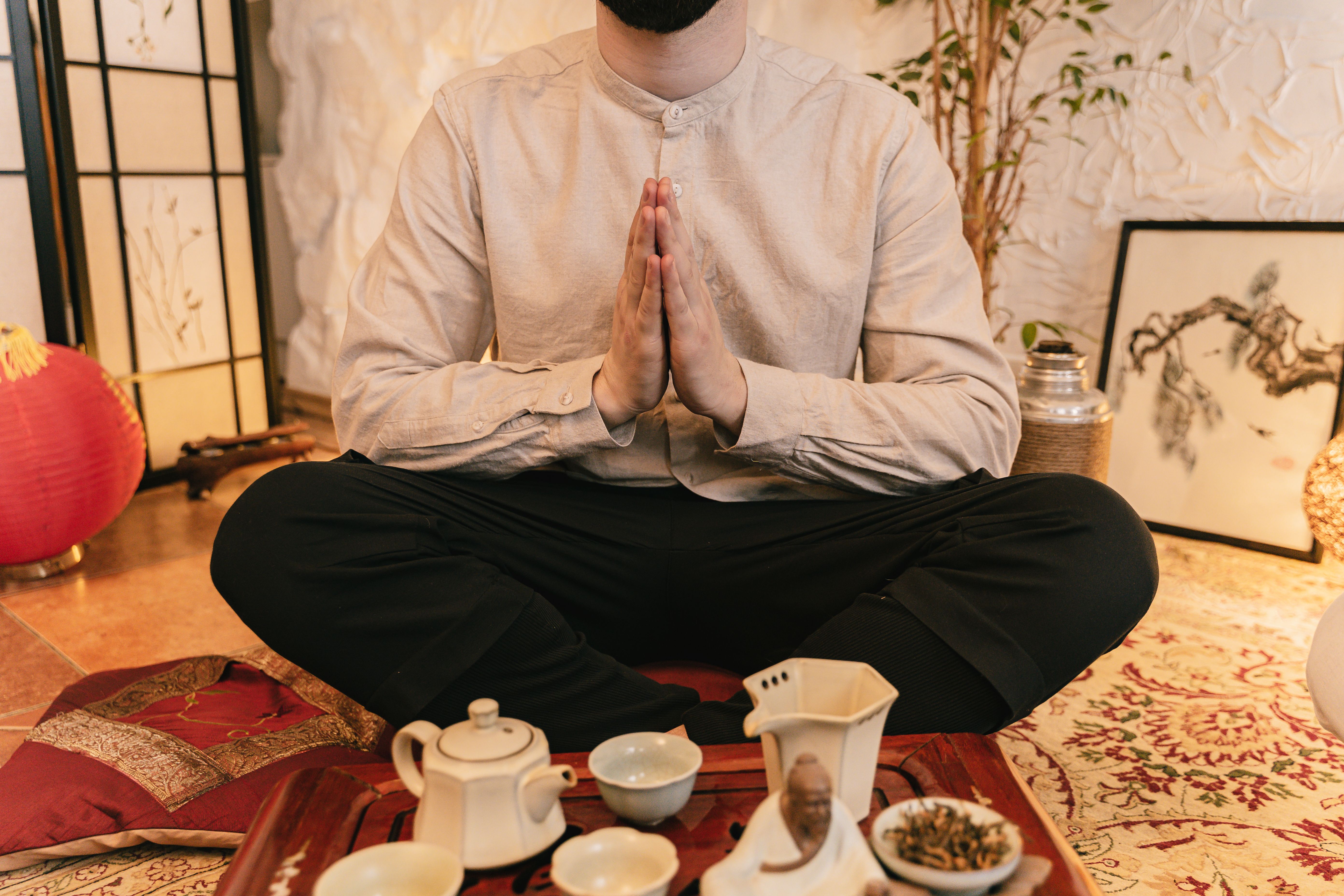 Two Men in Traditional Clothing Pouring Tea · Free Stock Photo