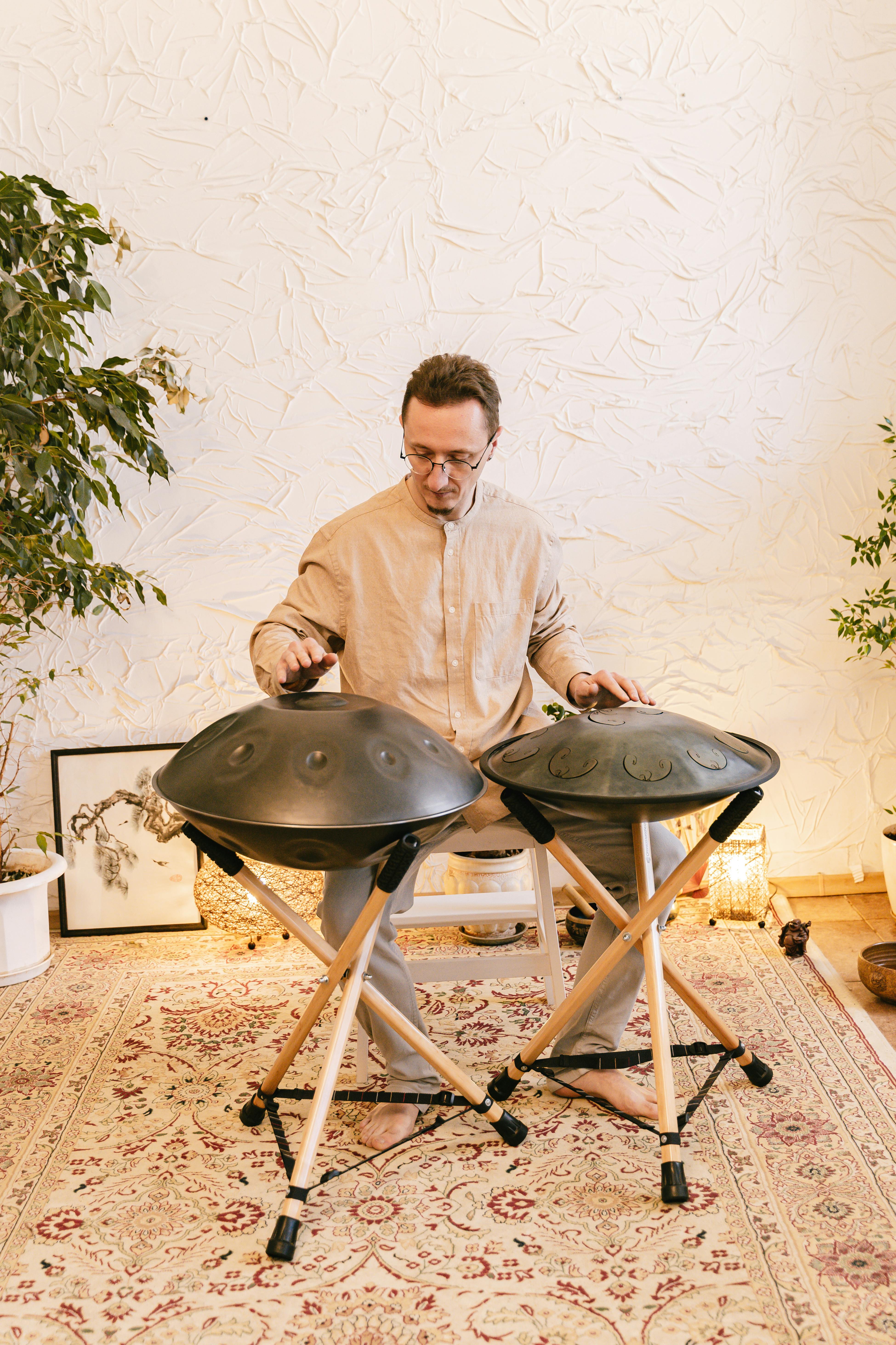 Man Playing Percussion Instruments · Free Stock Photo