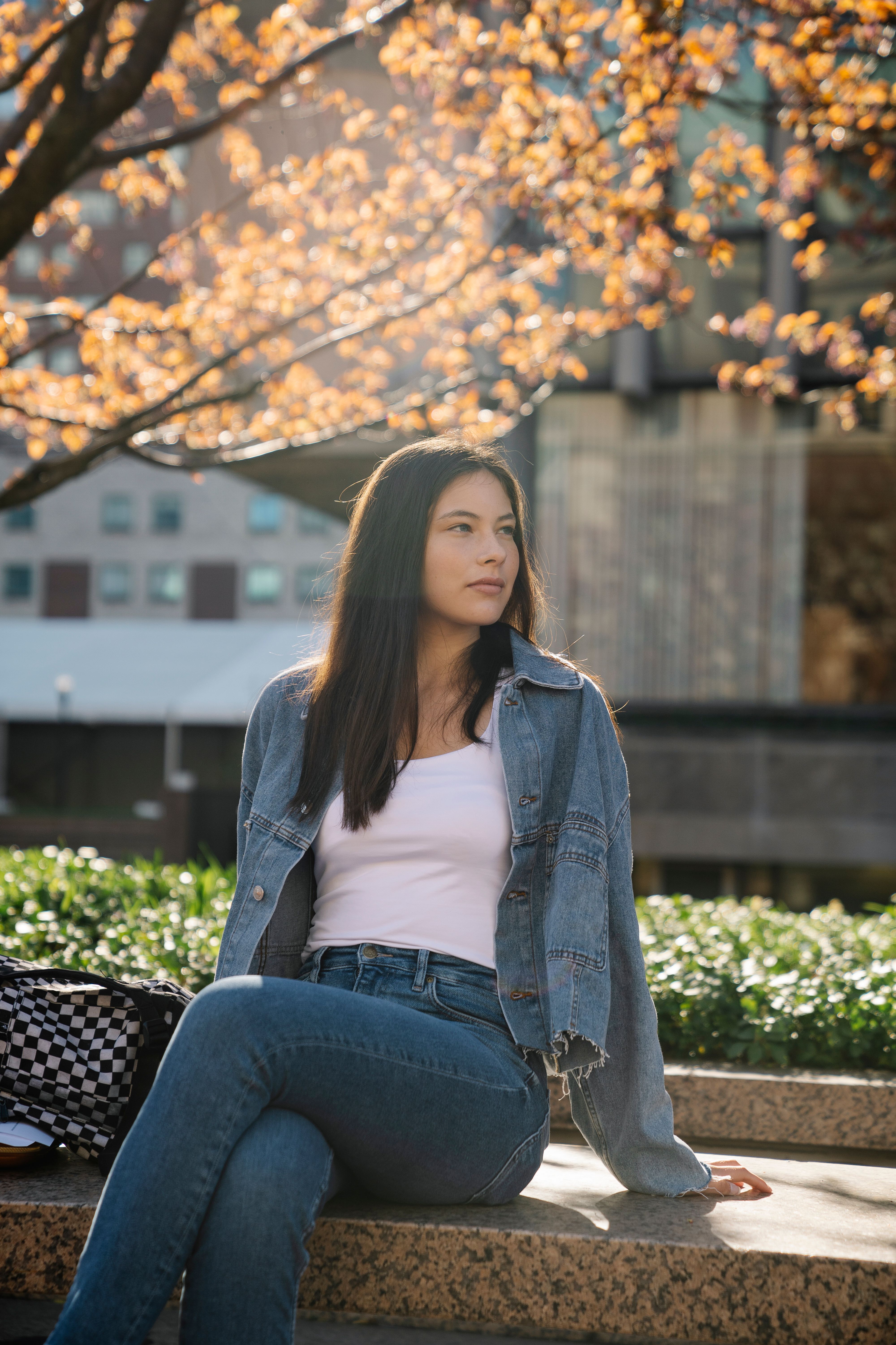 Woman Sitting and Posing · Free Stock Photo