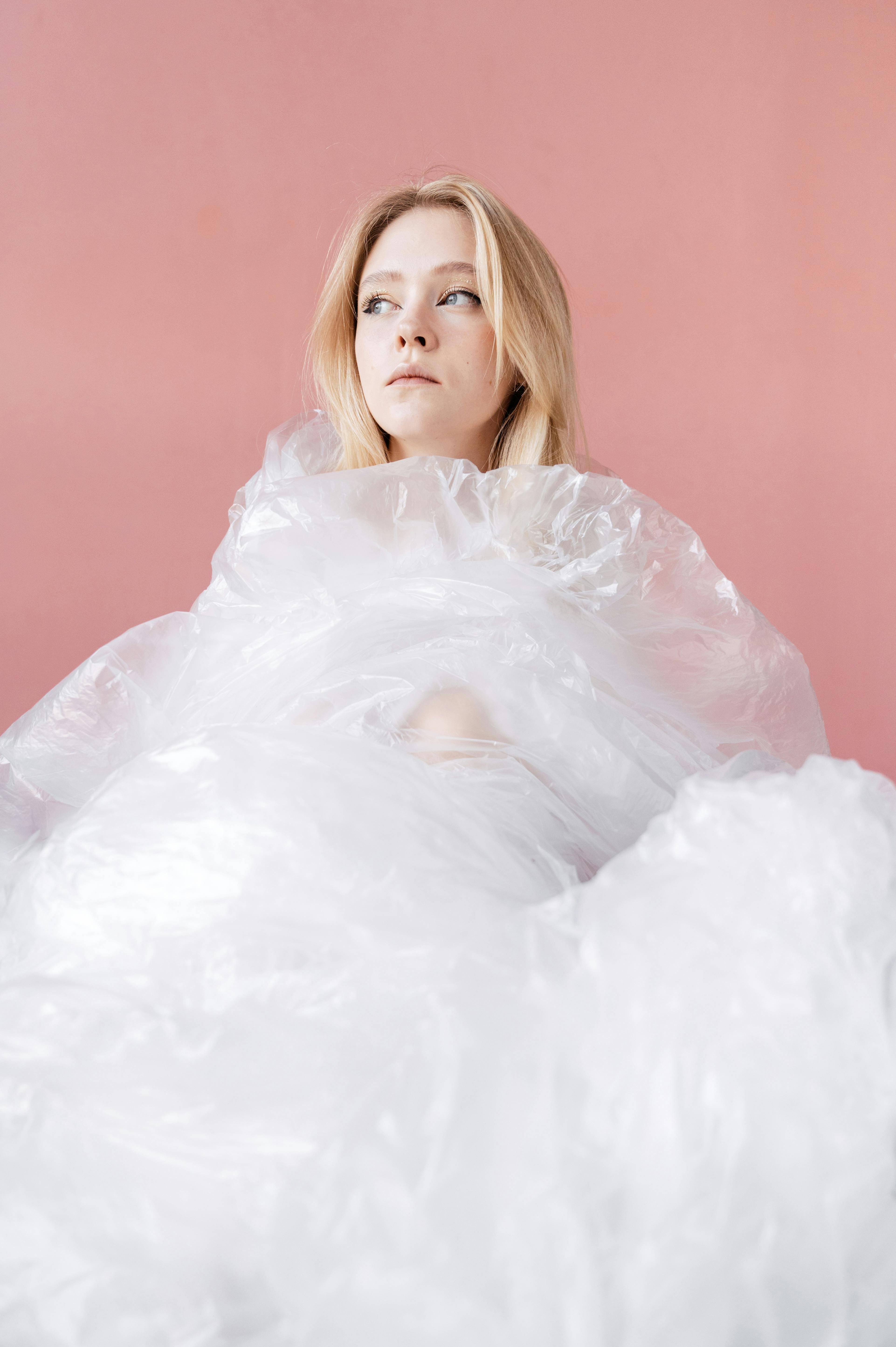 A Woman Wrapped in Plastic · Free Stock Photo