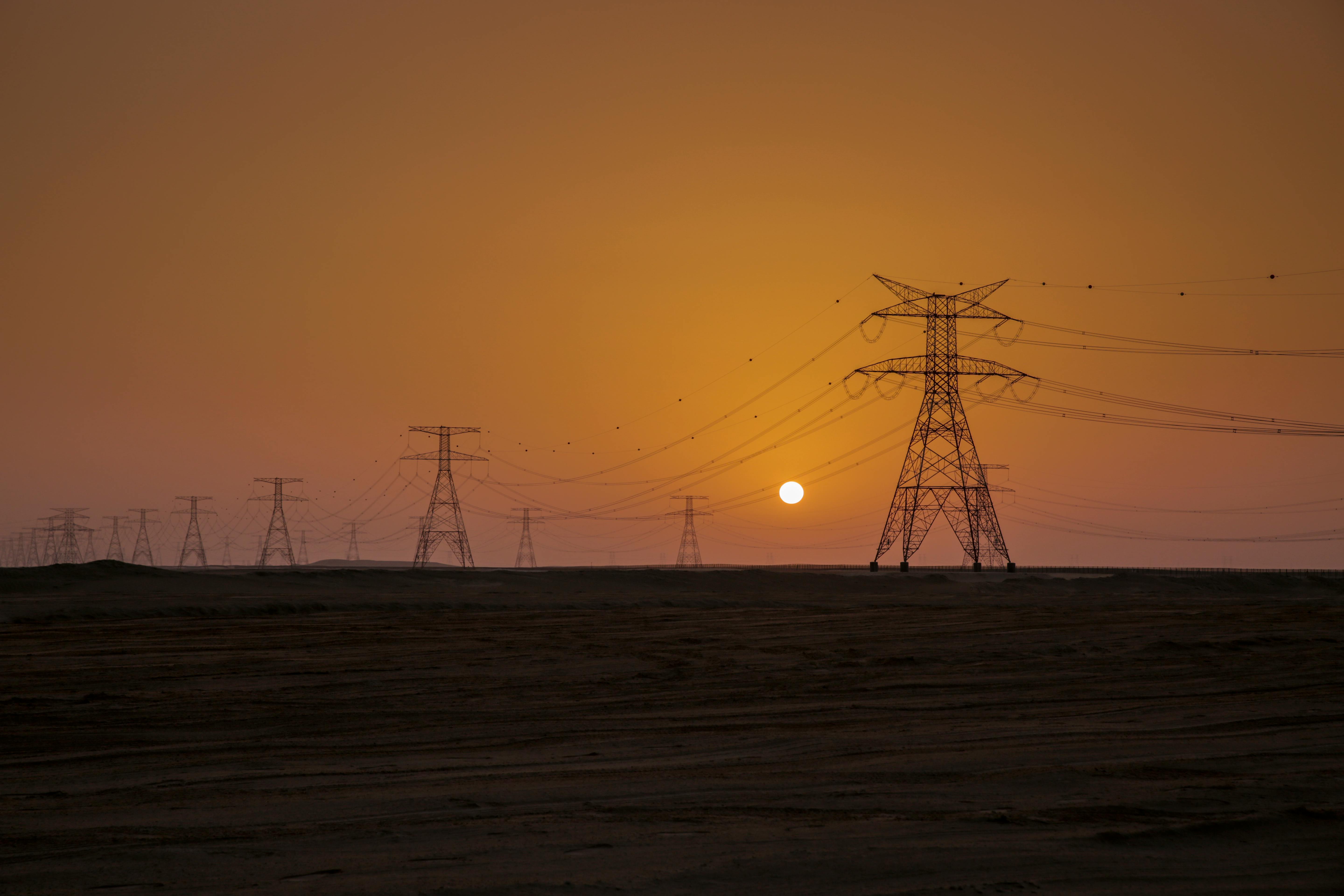 Silhouette of Power Lines during Sunset · Free Stock Photo