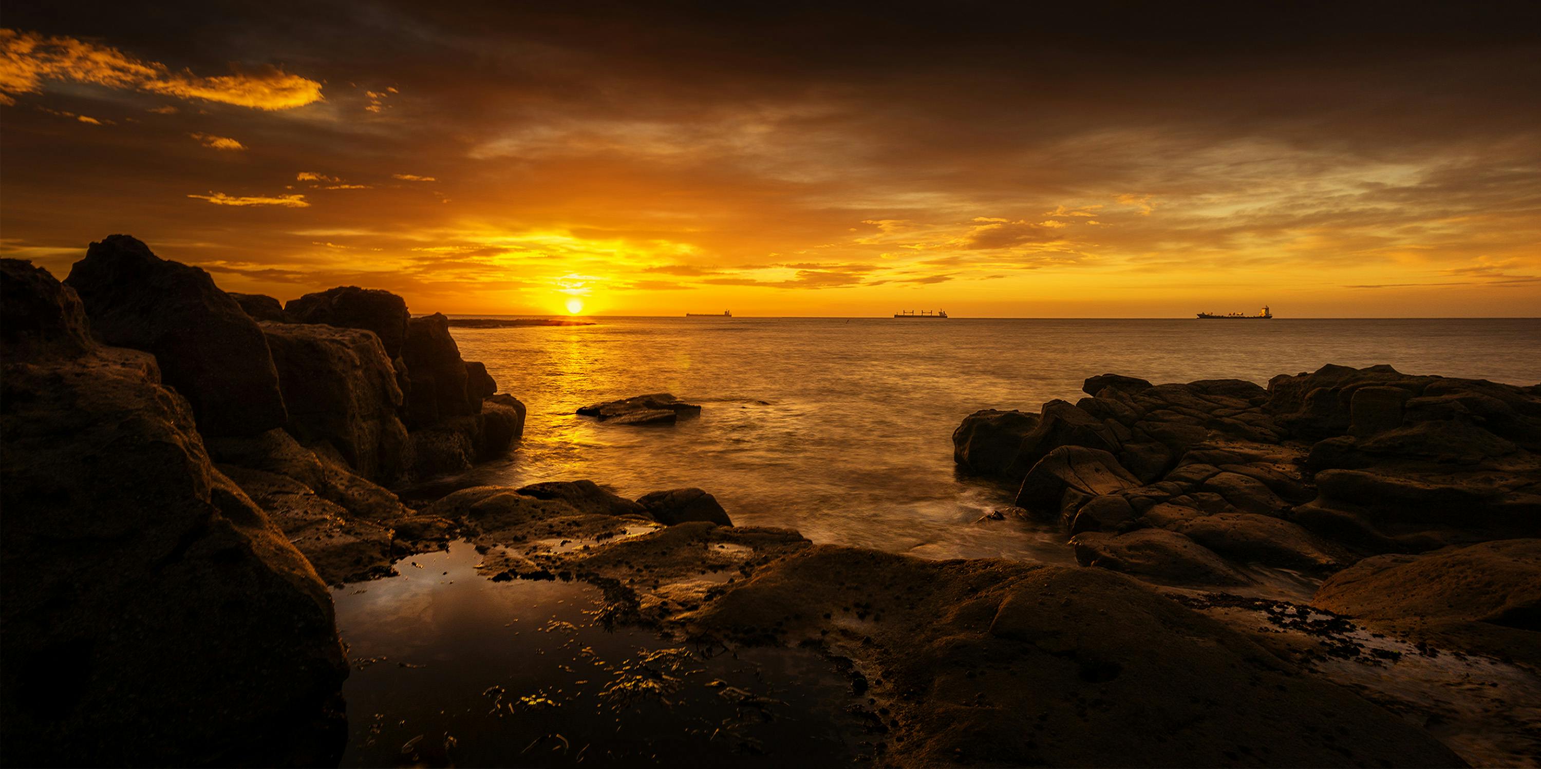 Waves Crashing on the Shore during Sunset · Free Stock Photo