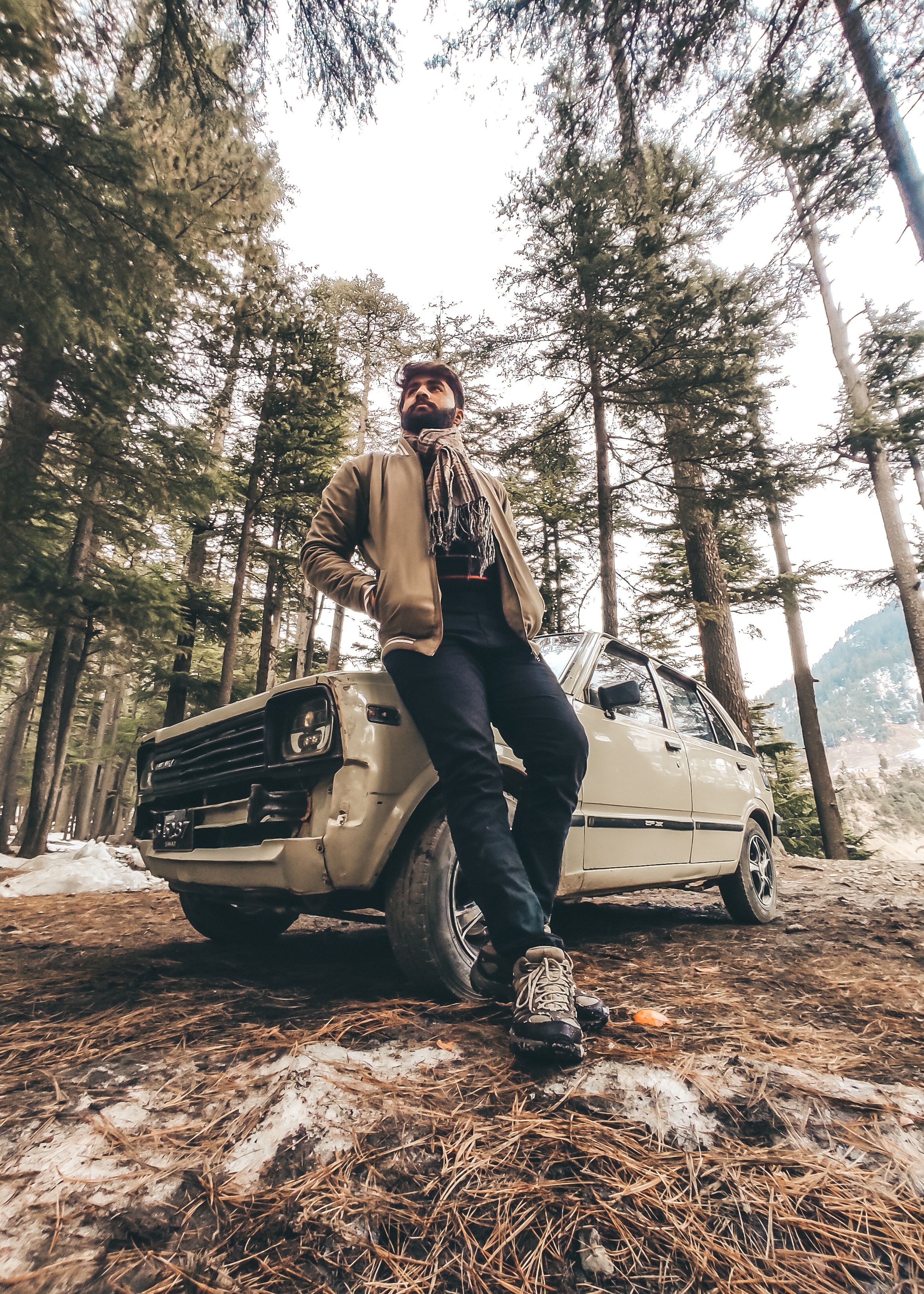 A Man Standing Beside the Car · Free Stock Photo