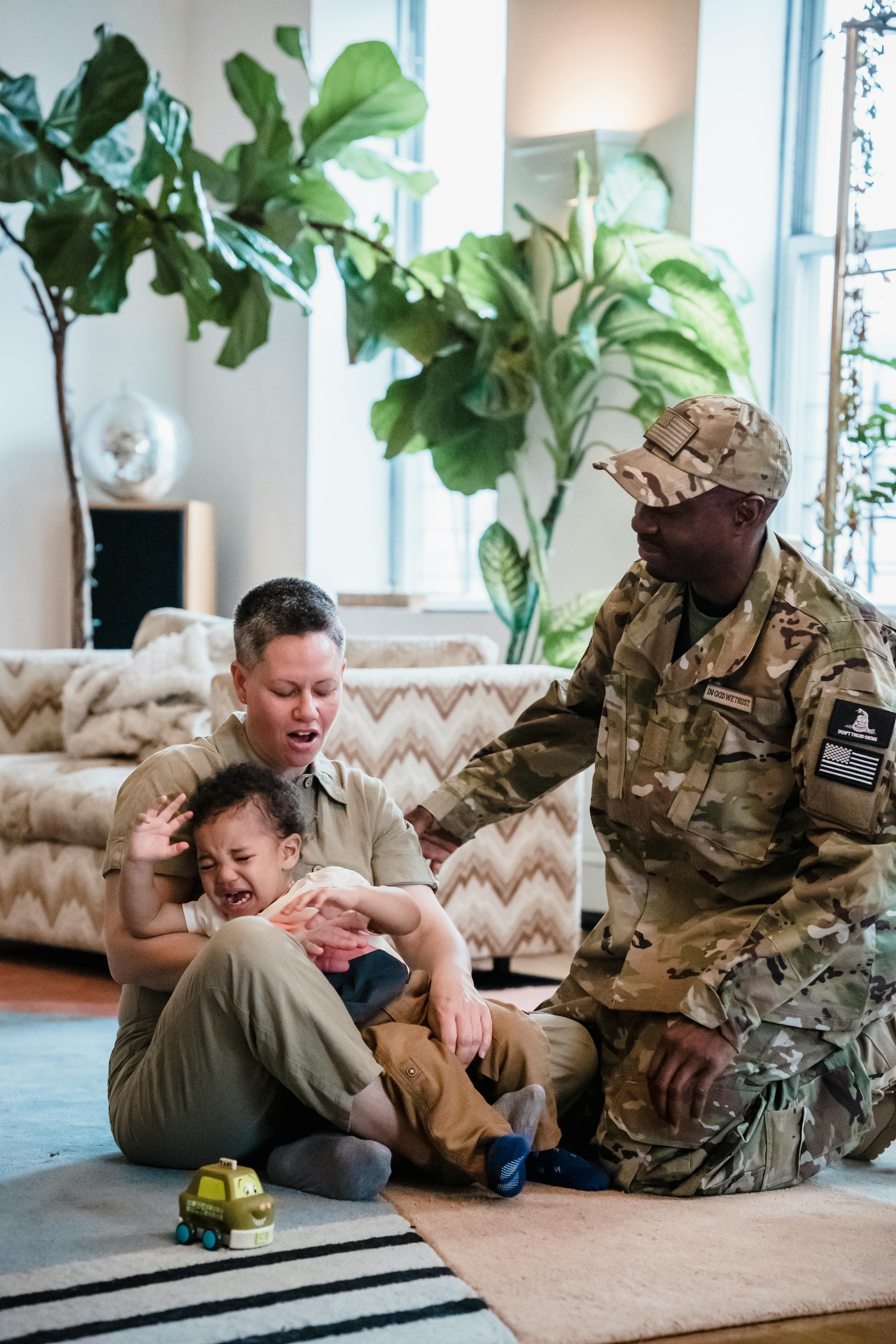 Parents Caring for Their Child · Free Stock Photo