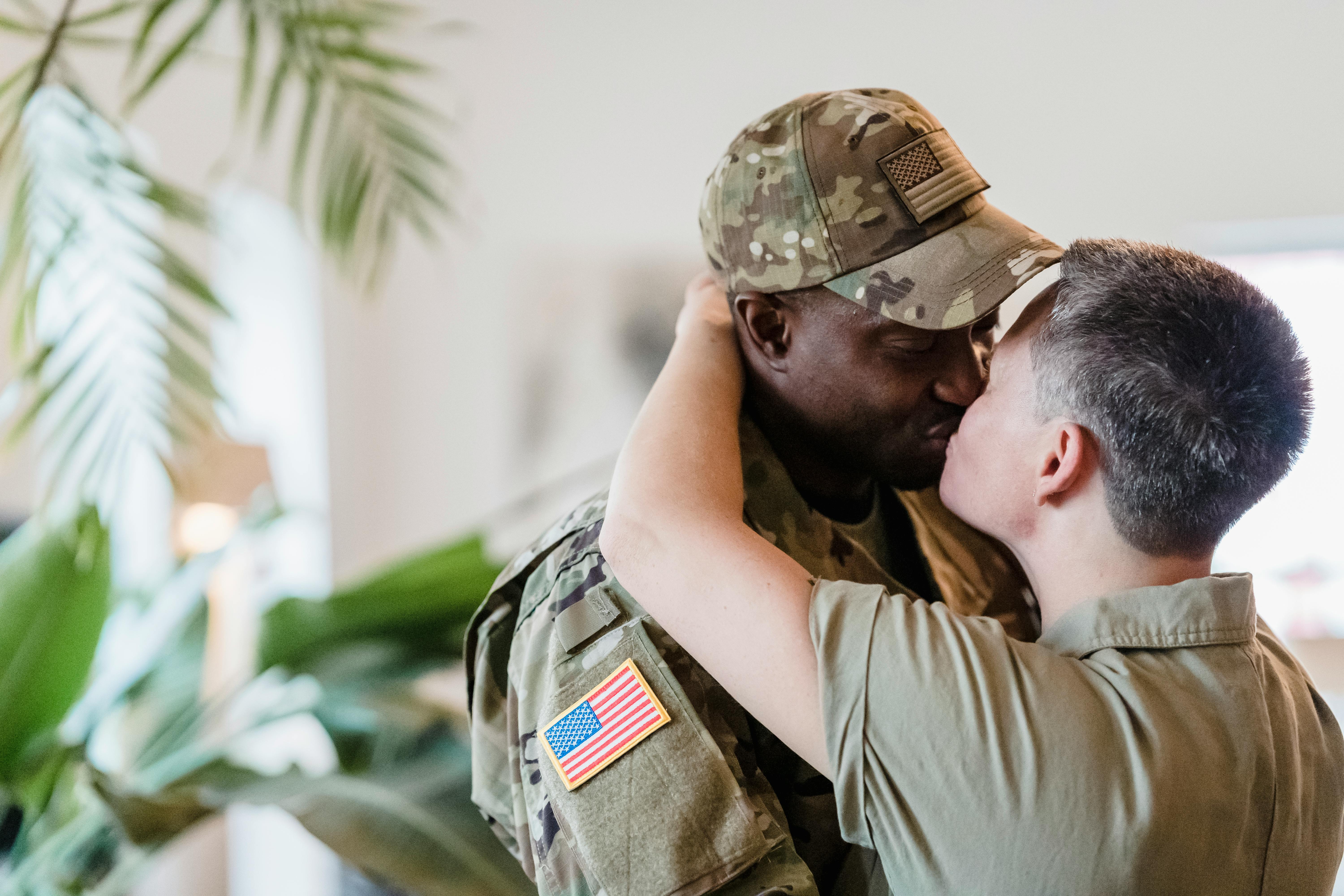 Army Couple Kissing · Free Stock Photo