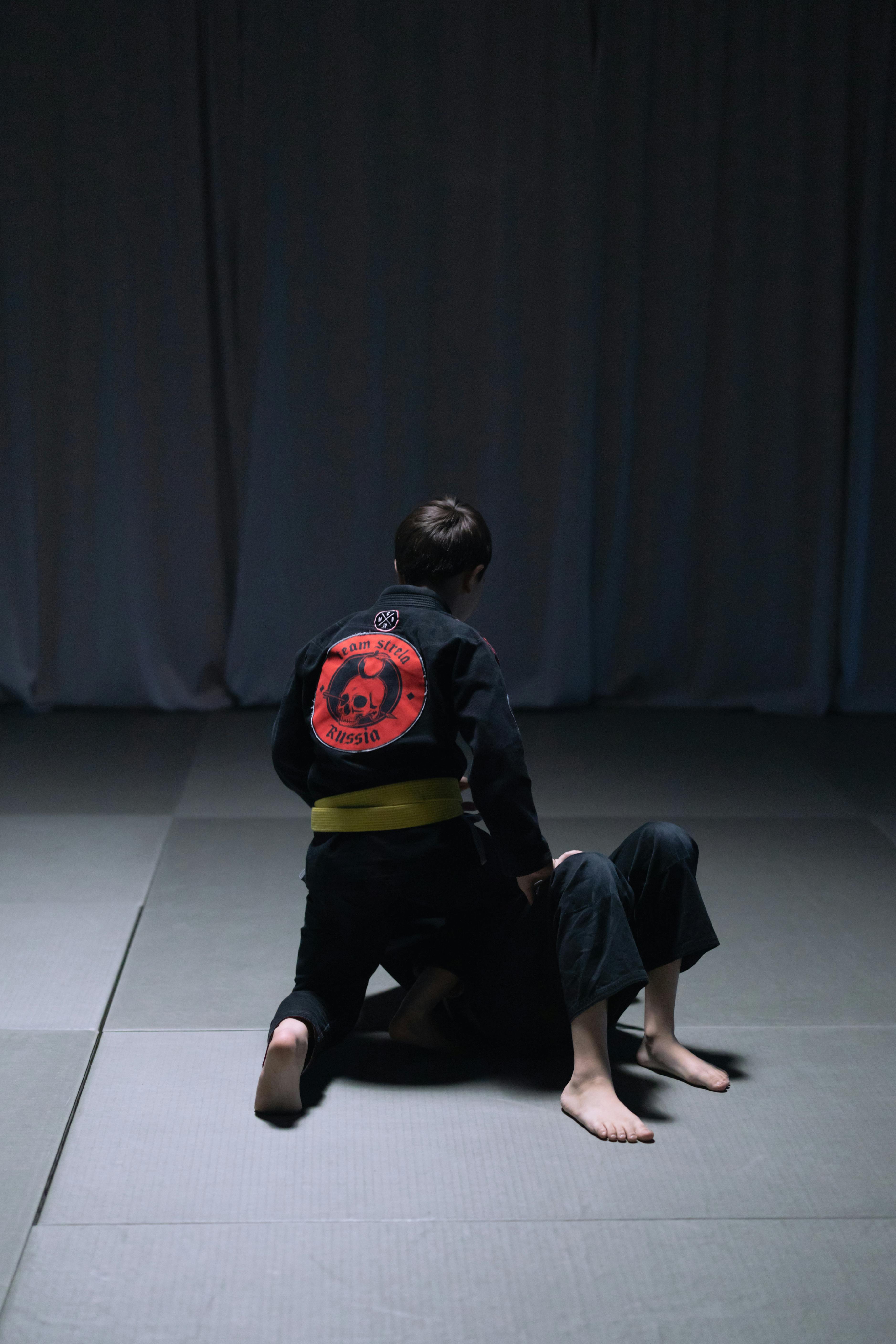 Back View of Jiu Jitsu Fighters Fighting · Free Stock Photo