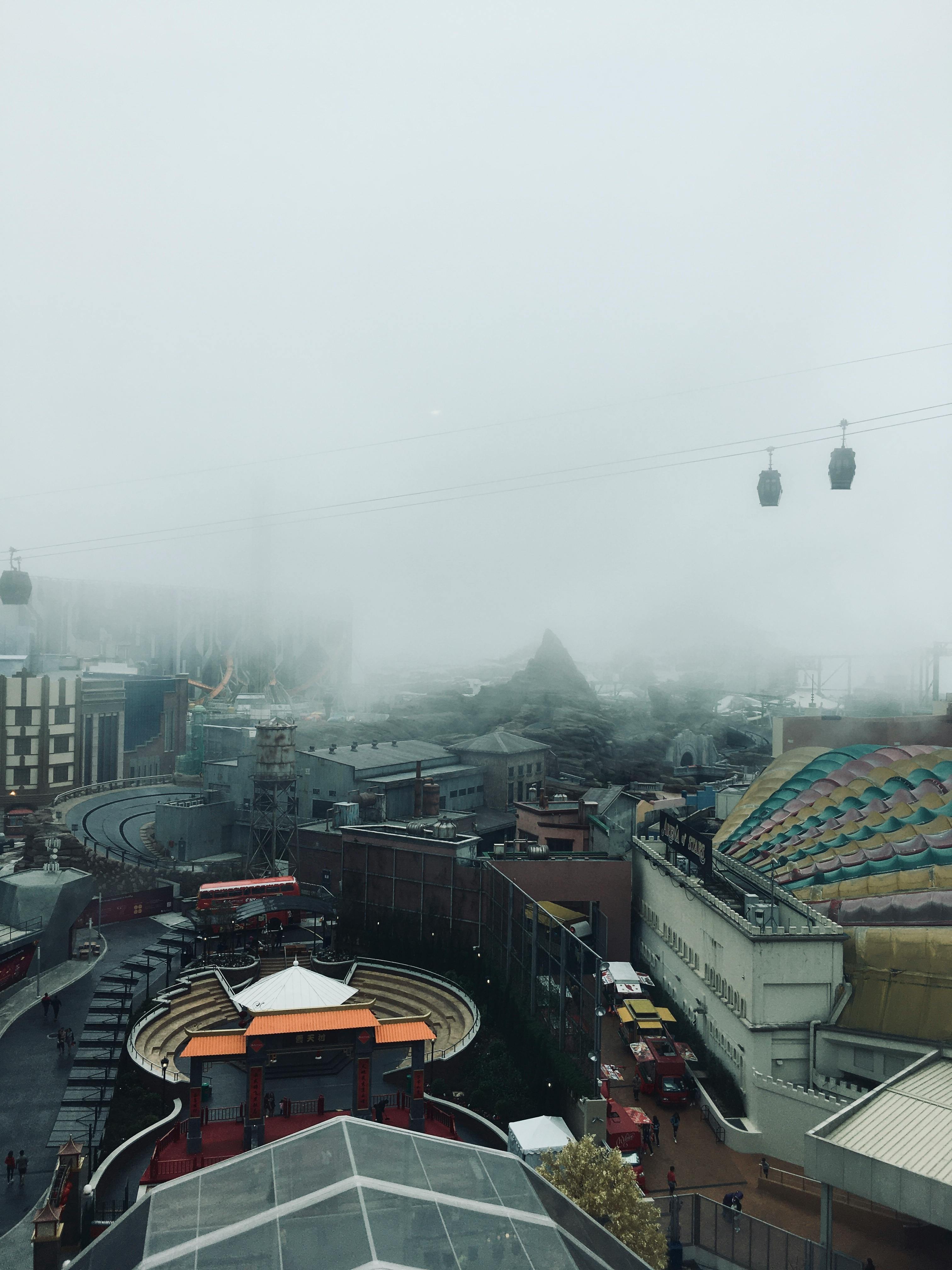 Aerial View of City Buildings with Fog · Free Stock Photo