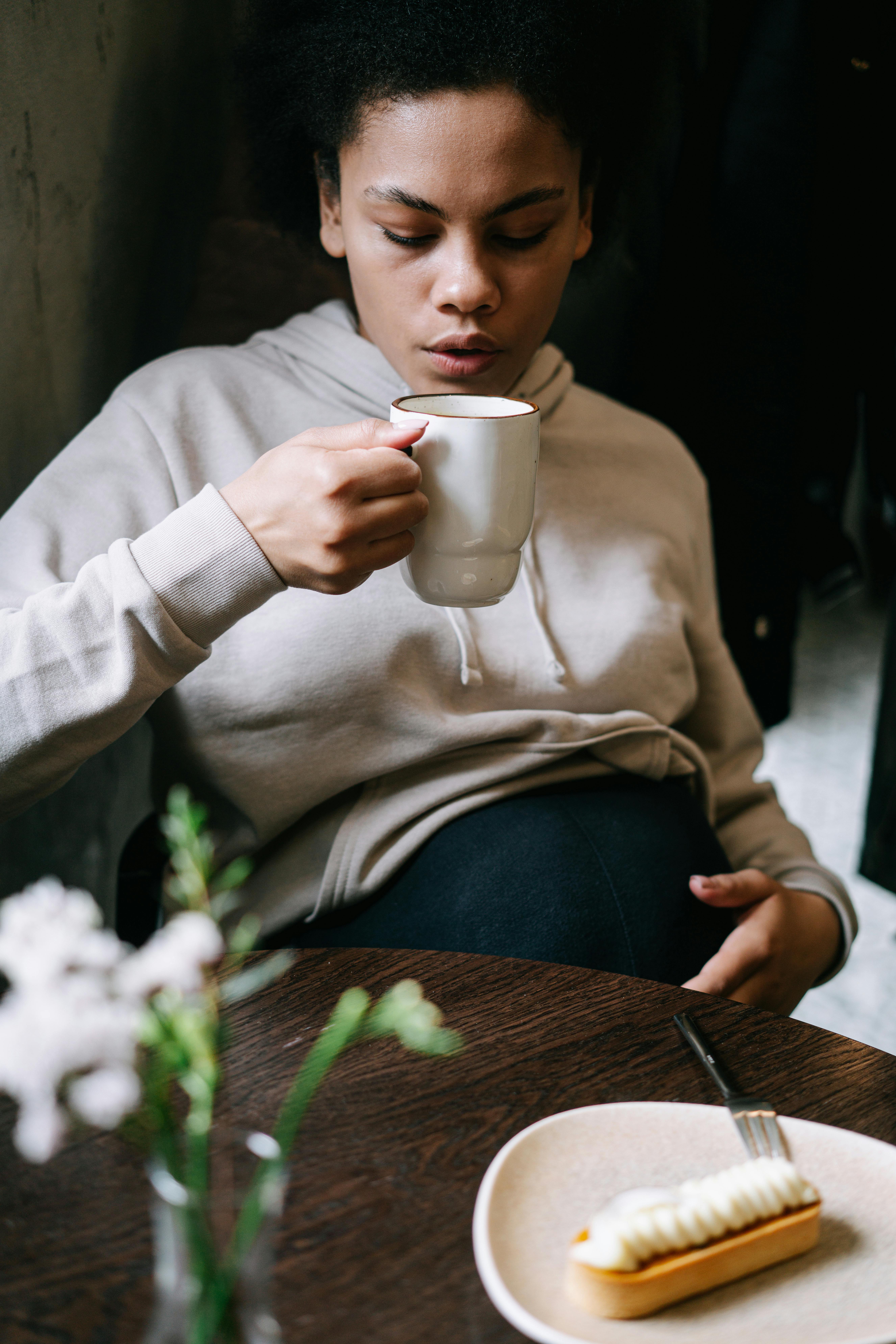 A Black American Drinking Tea Photos, Download The BEST Free A Black ...