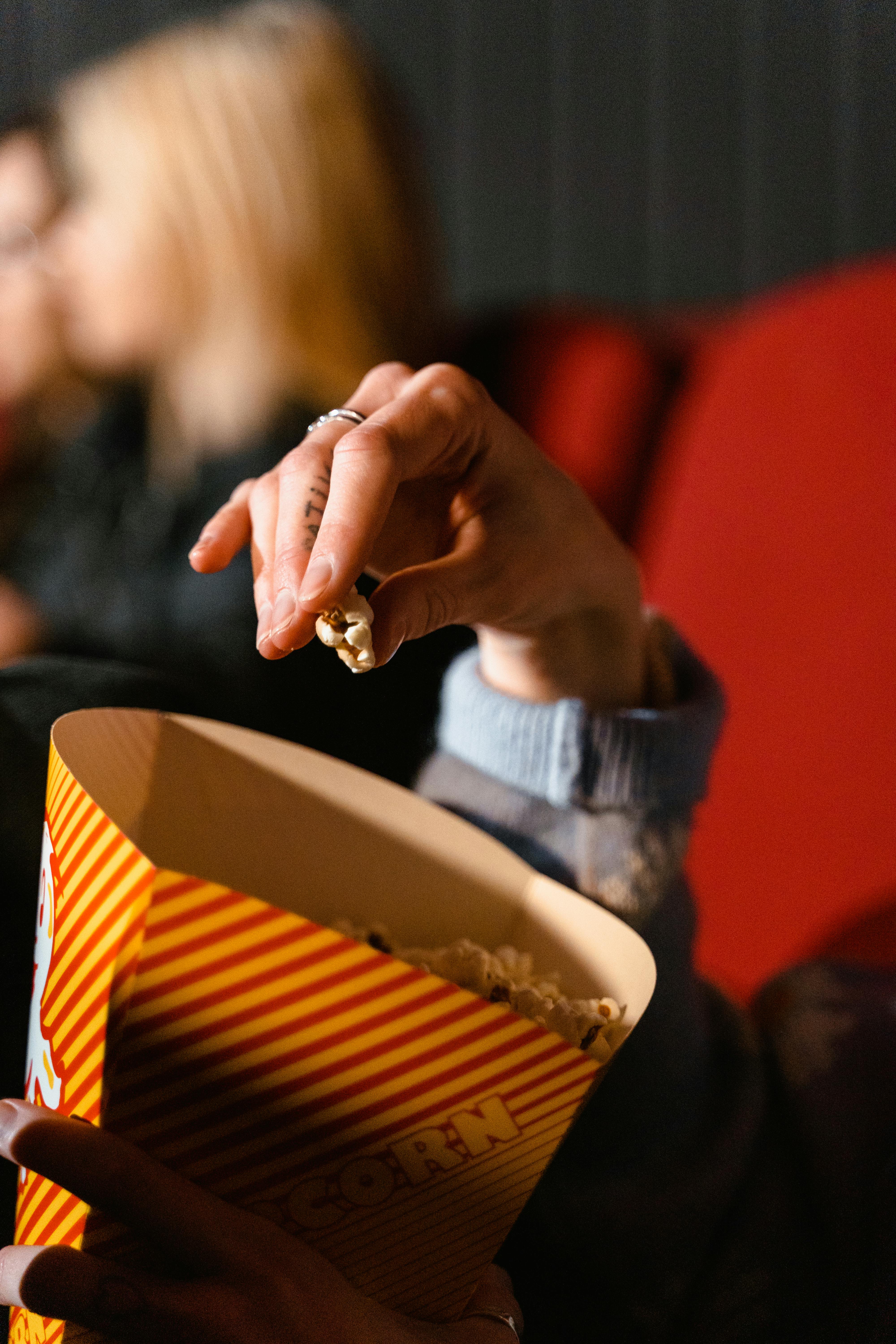 A Person Holding Popcorn · Free Stock Photo