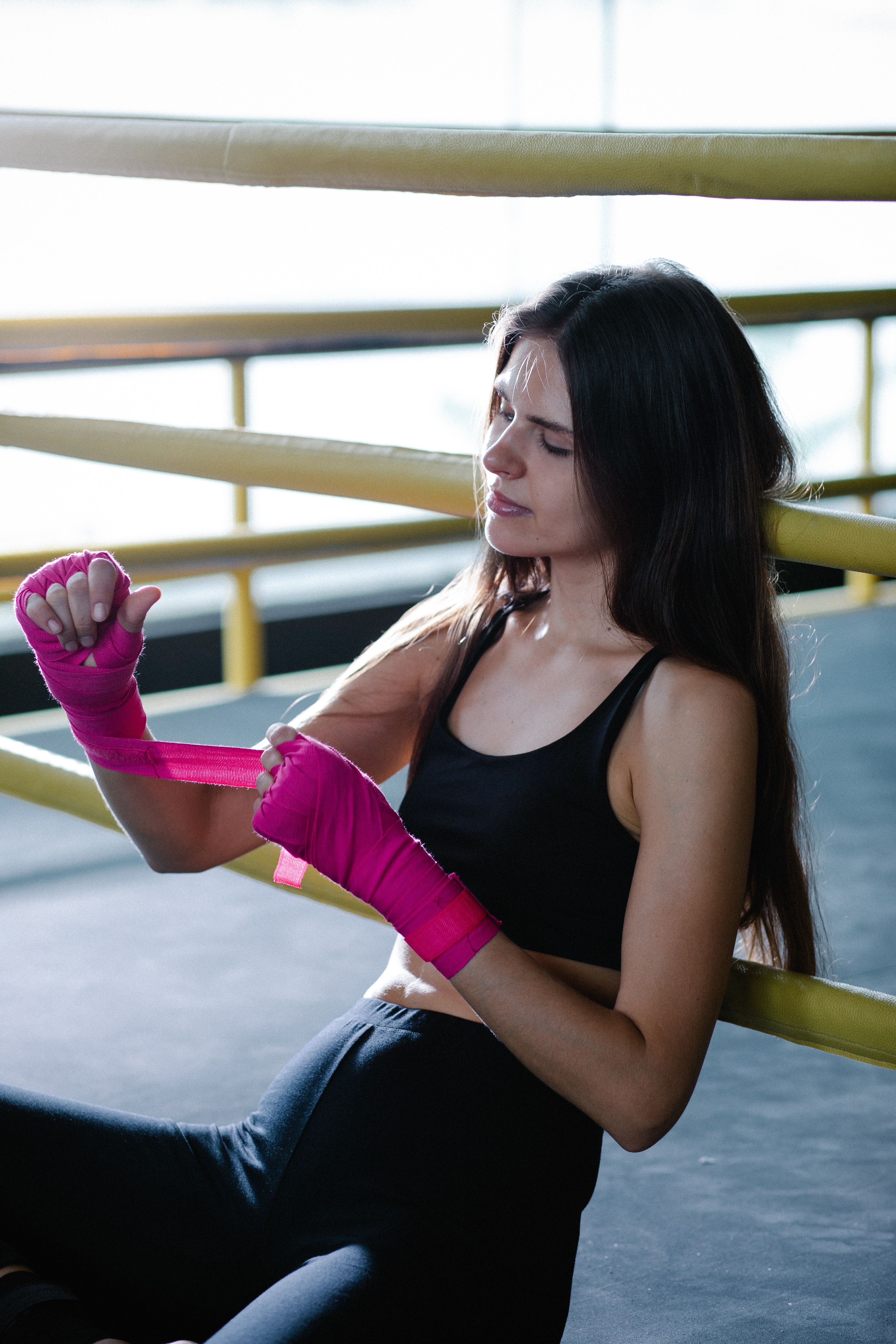 Female Boxer Wrapping her Hands · Free Stock Photo
