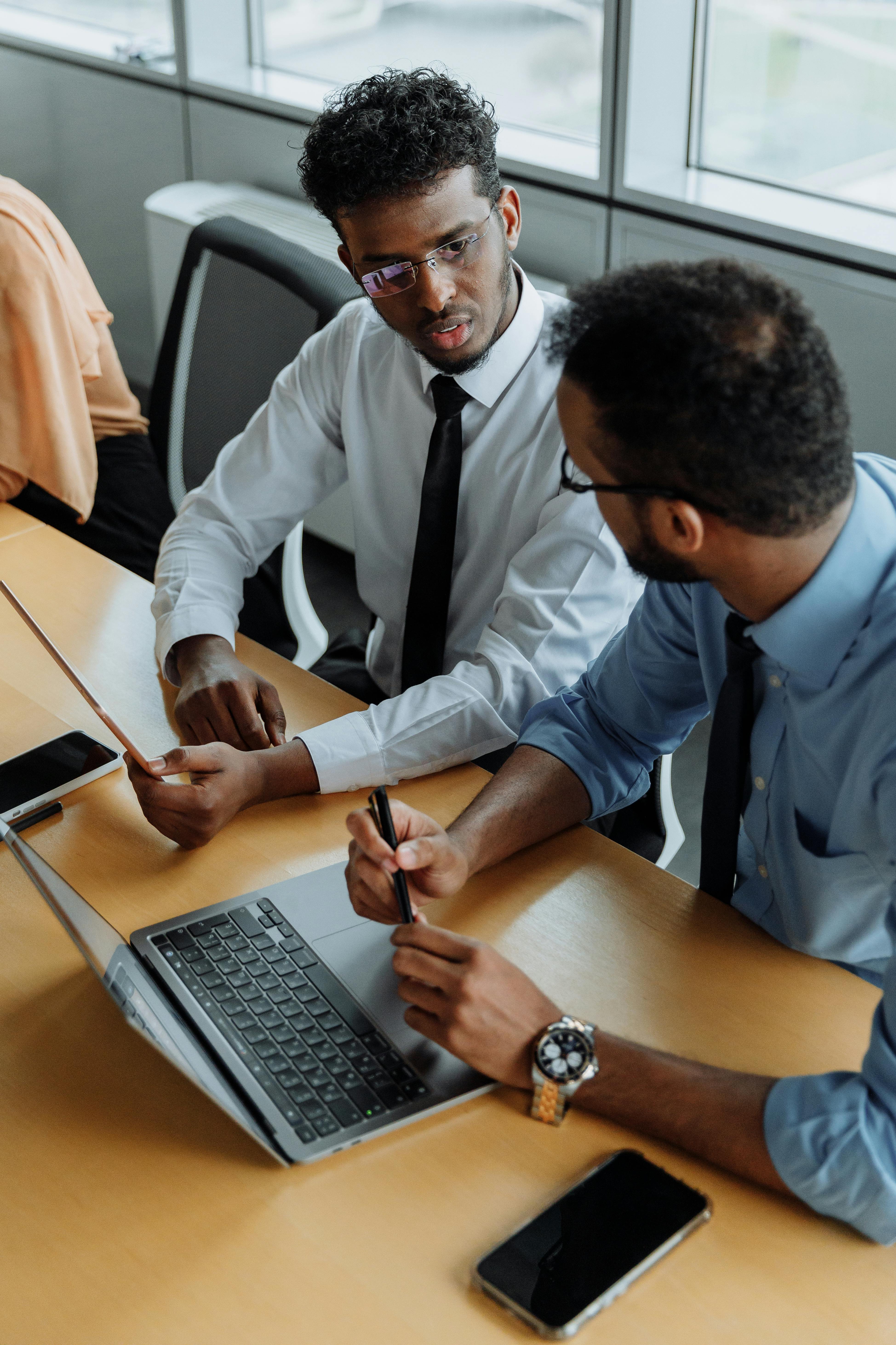 Woman Discussing With Her Colleagues · Free Stock Photo