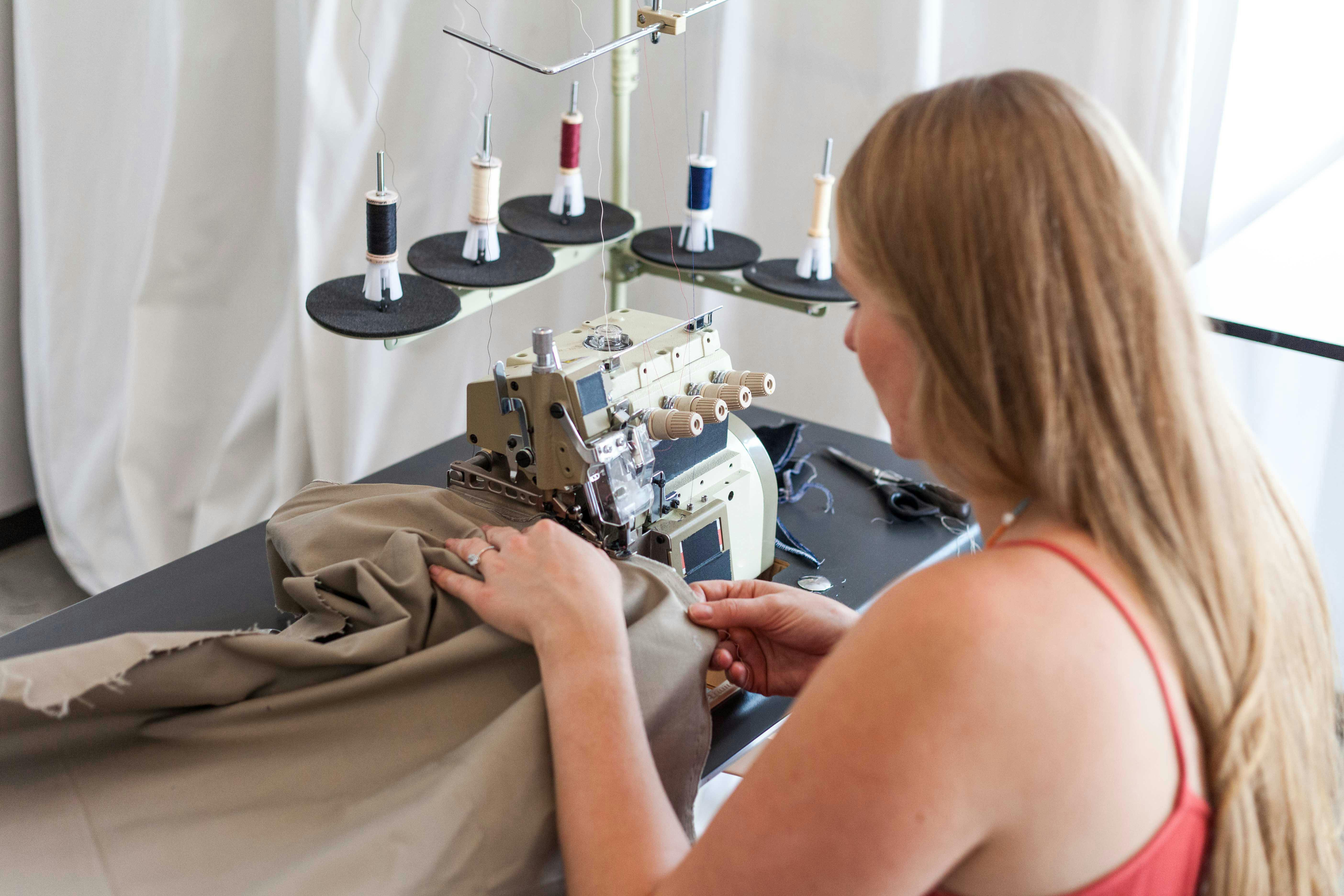 Back View of Woman Sewing · Free Stock Photo