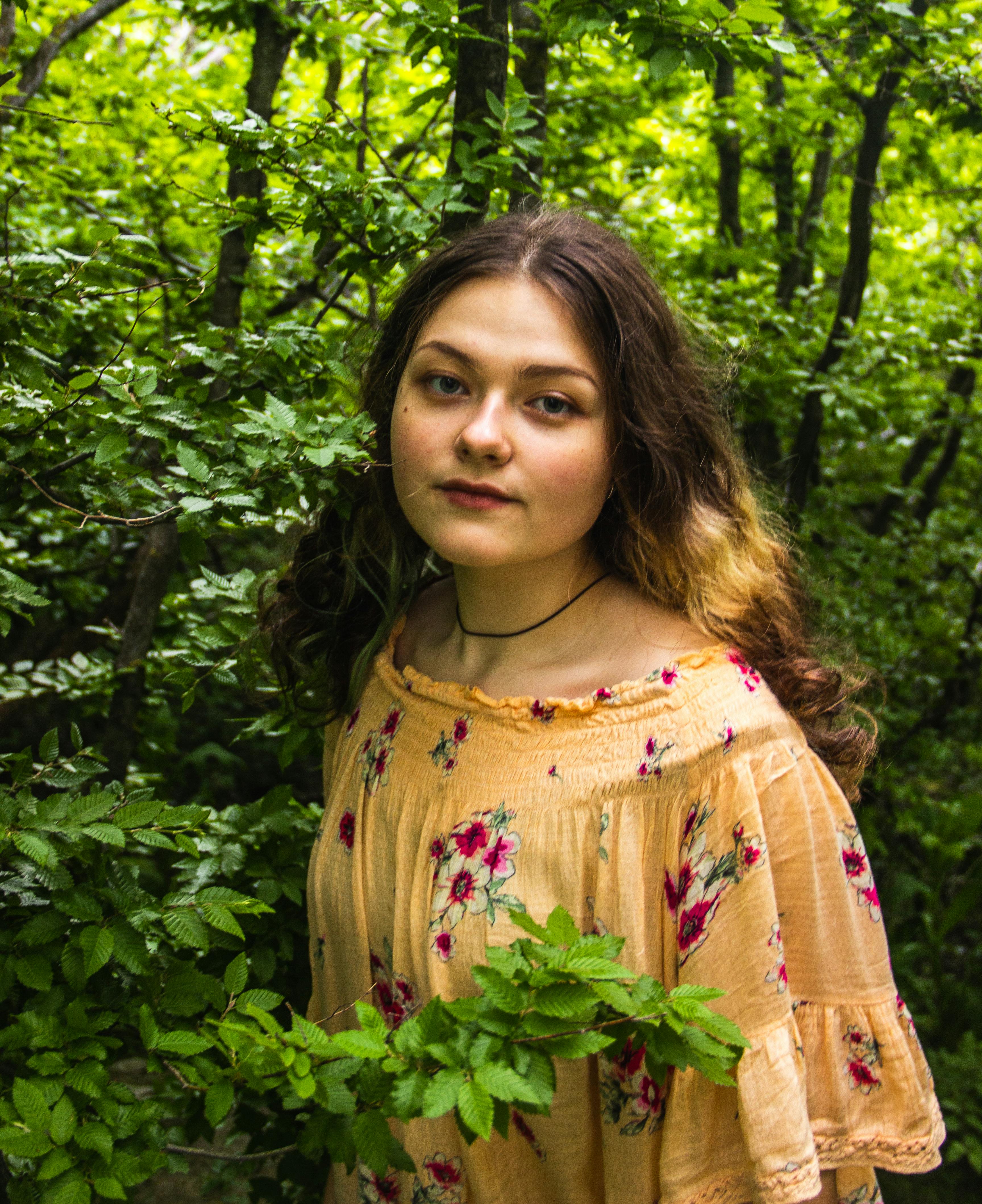A Shirtless Girl Wearing Floral Skirt · Free Stock Photo