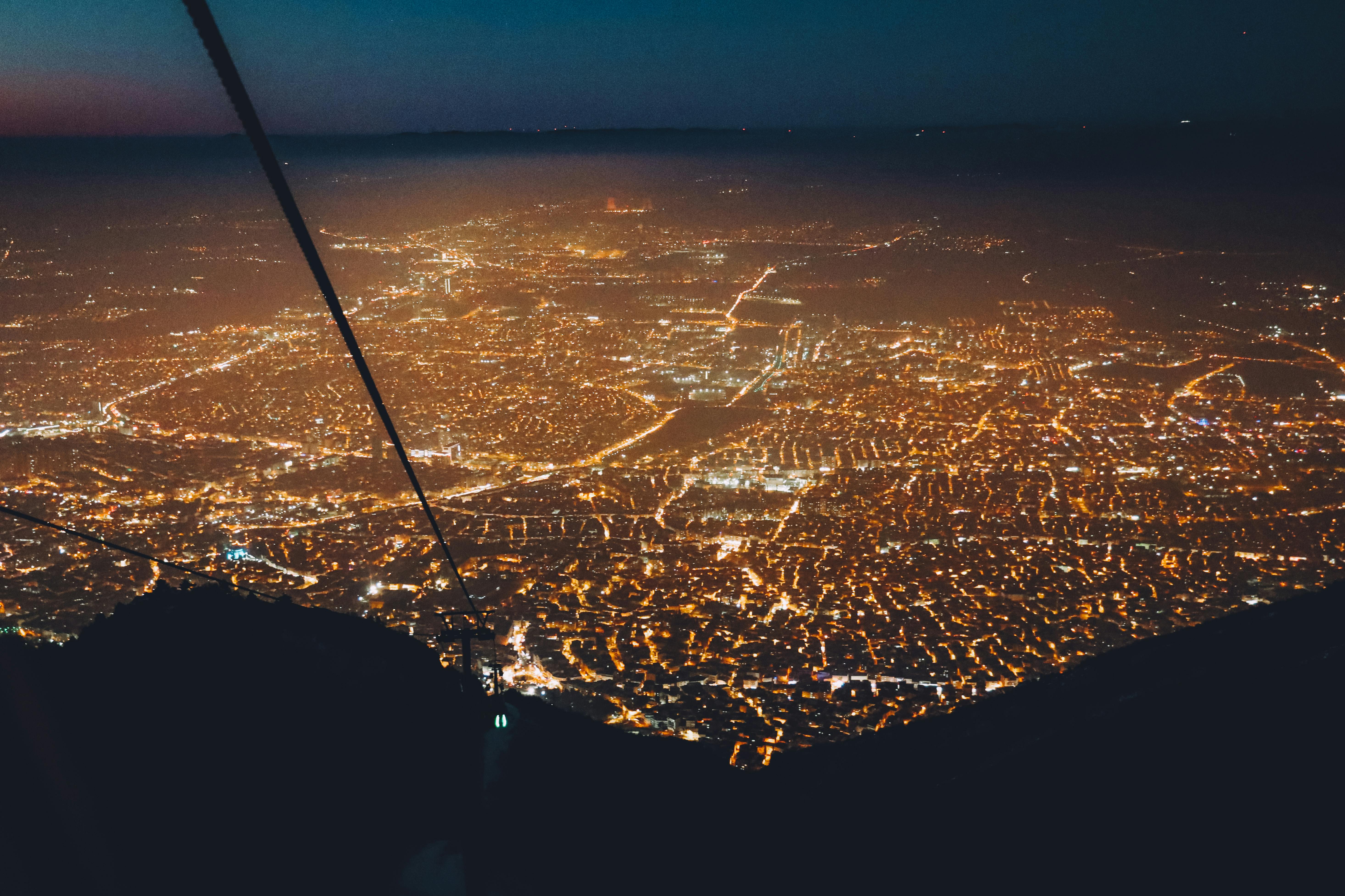 Glowing illuminated city at night · Free Stock Photo