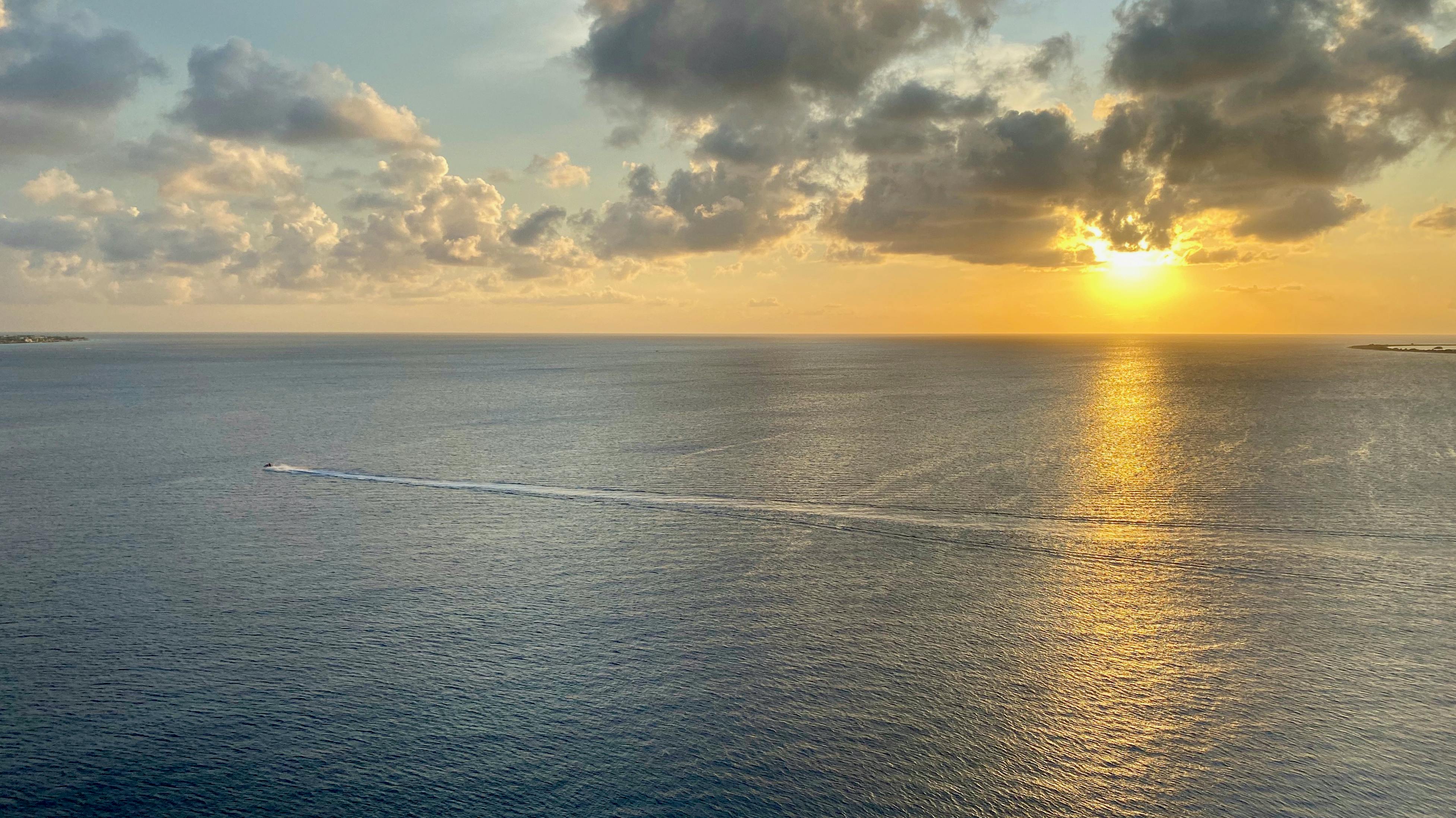 Aerial Shot of a City Under a Cinematic Sky · Free Stock Photo