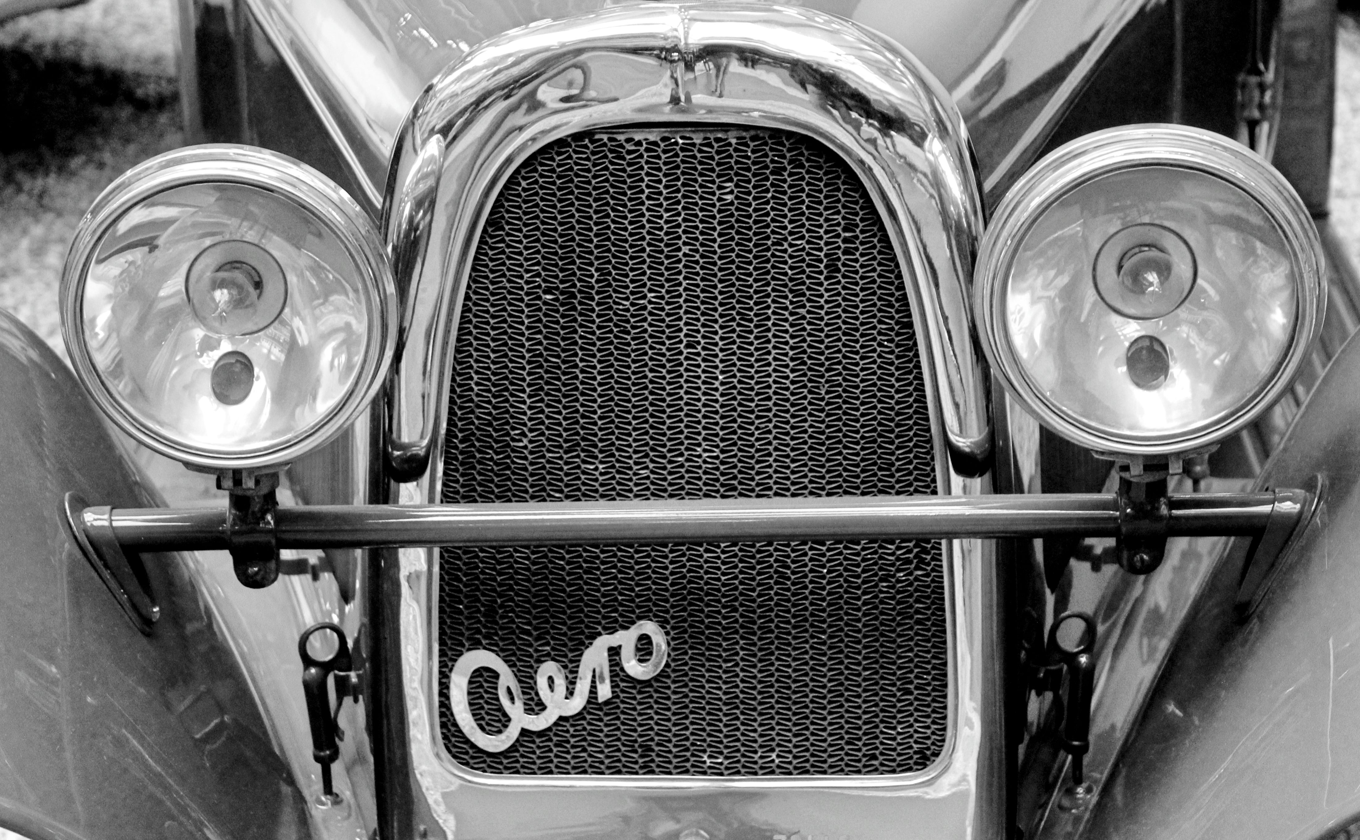 Grayscale Photo of a Car · Free Stock Photo