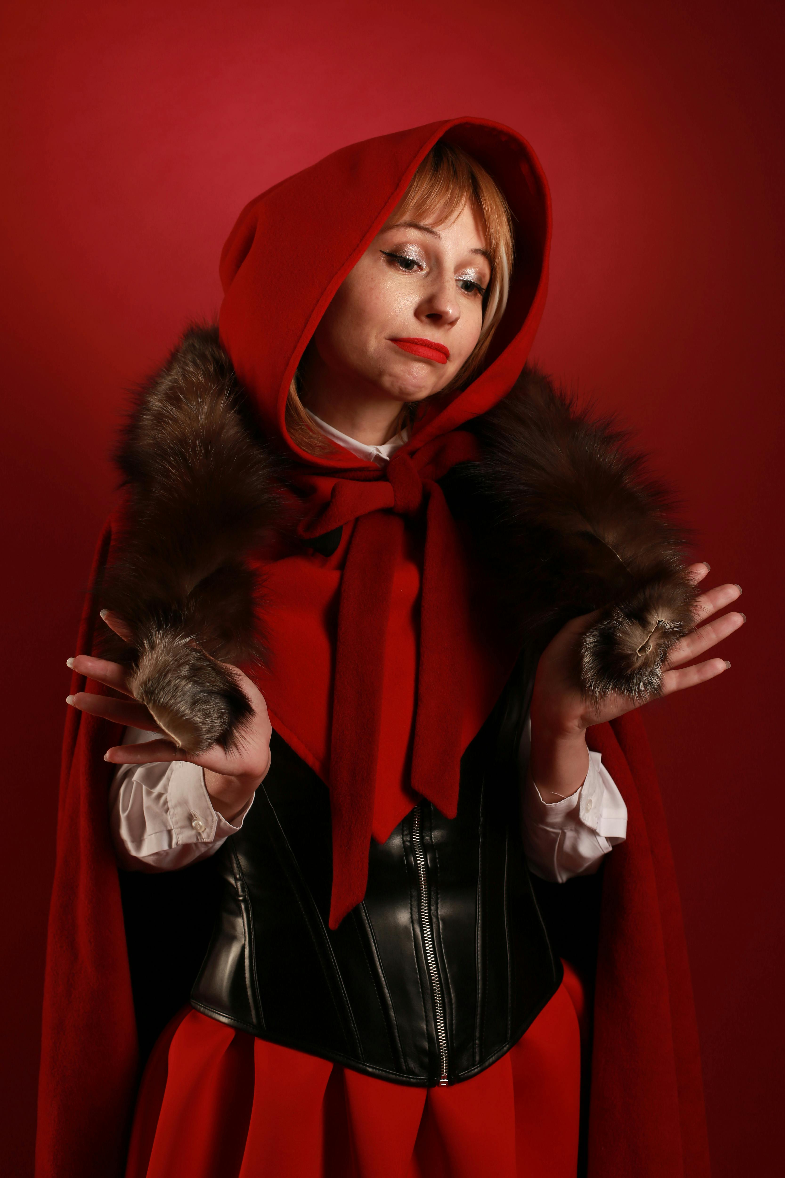 Woman Wearing a Red Cape · Free Stock Photo