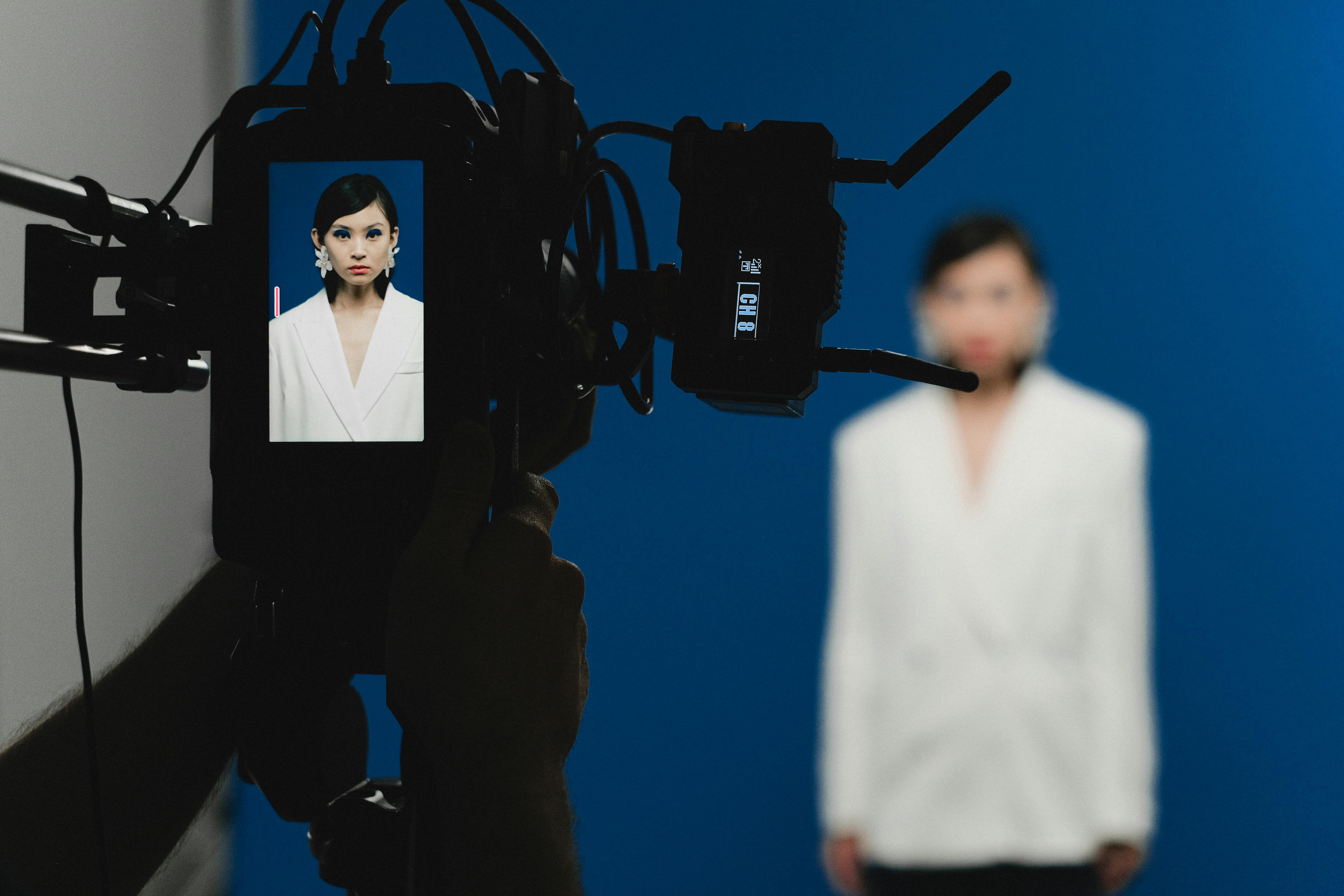 Brunette Woman on Camera Screen at Photo Session · Free Stock Photo