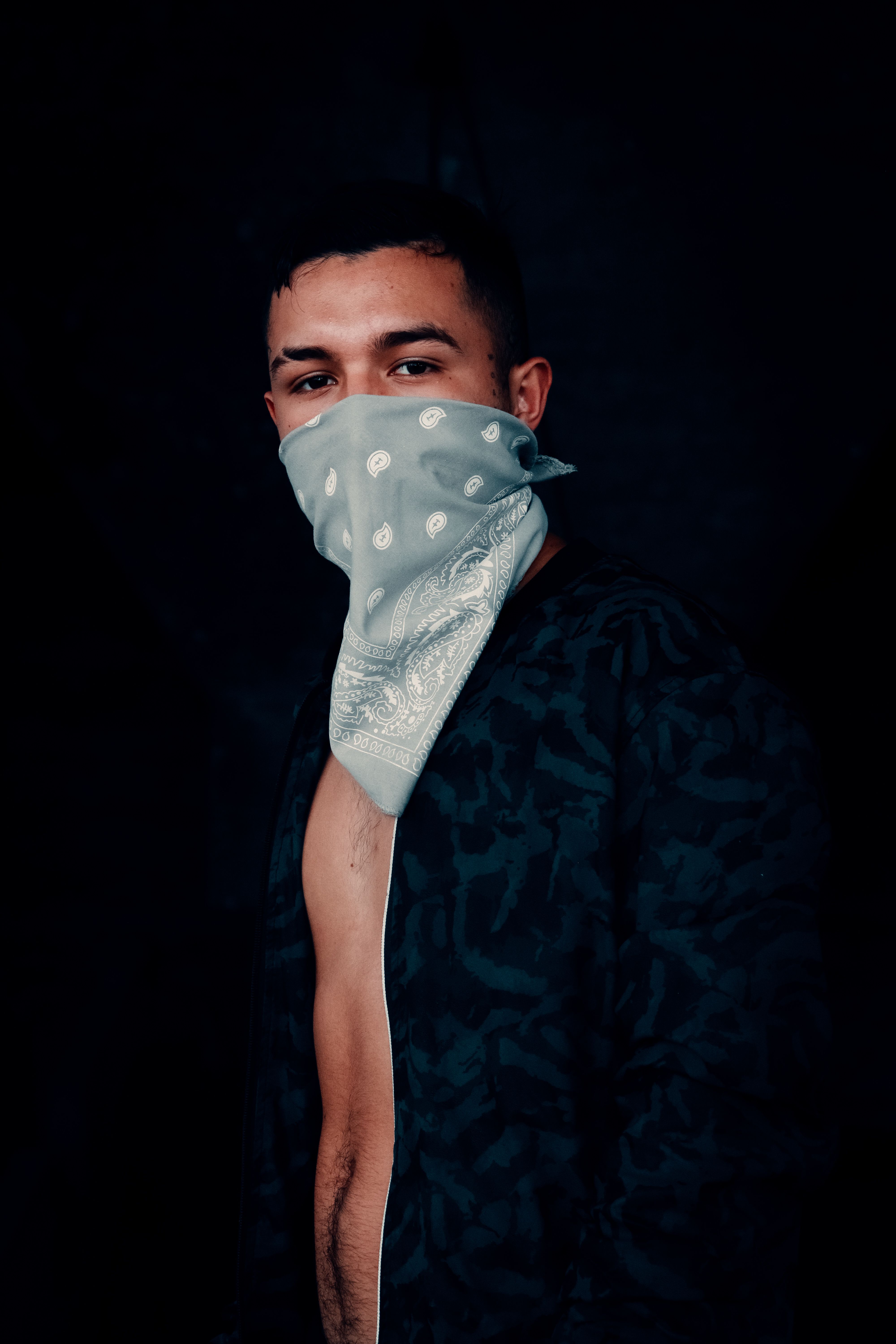 A Man Covering His Face with a Handkerchief · Free Stock Photo