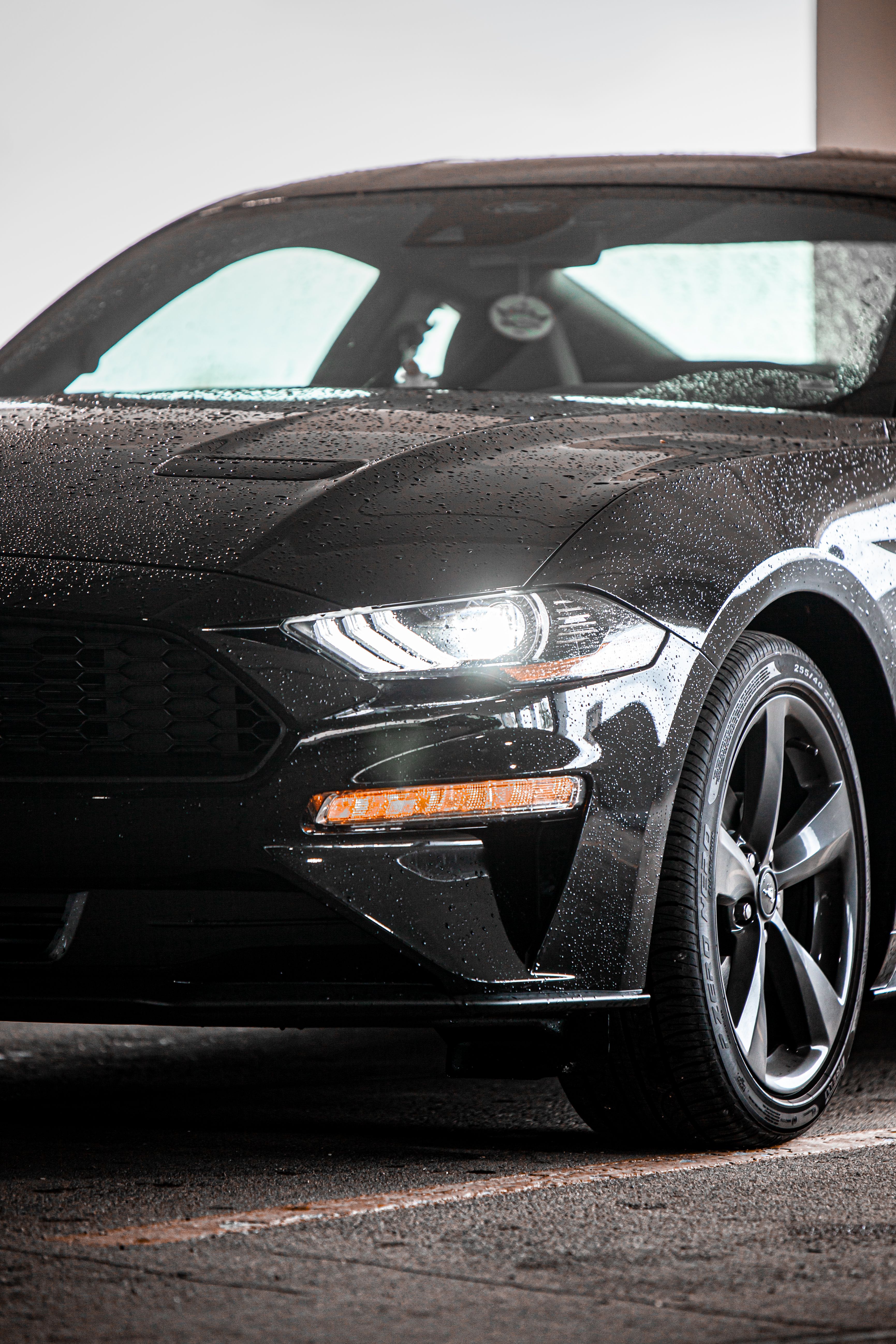 Close Up of Wet Black Car · Free Stock Photo