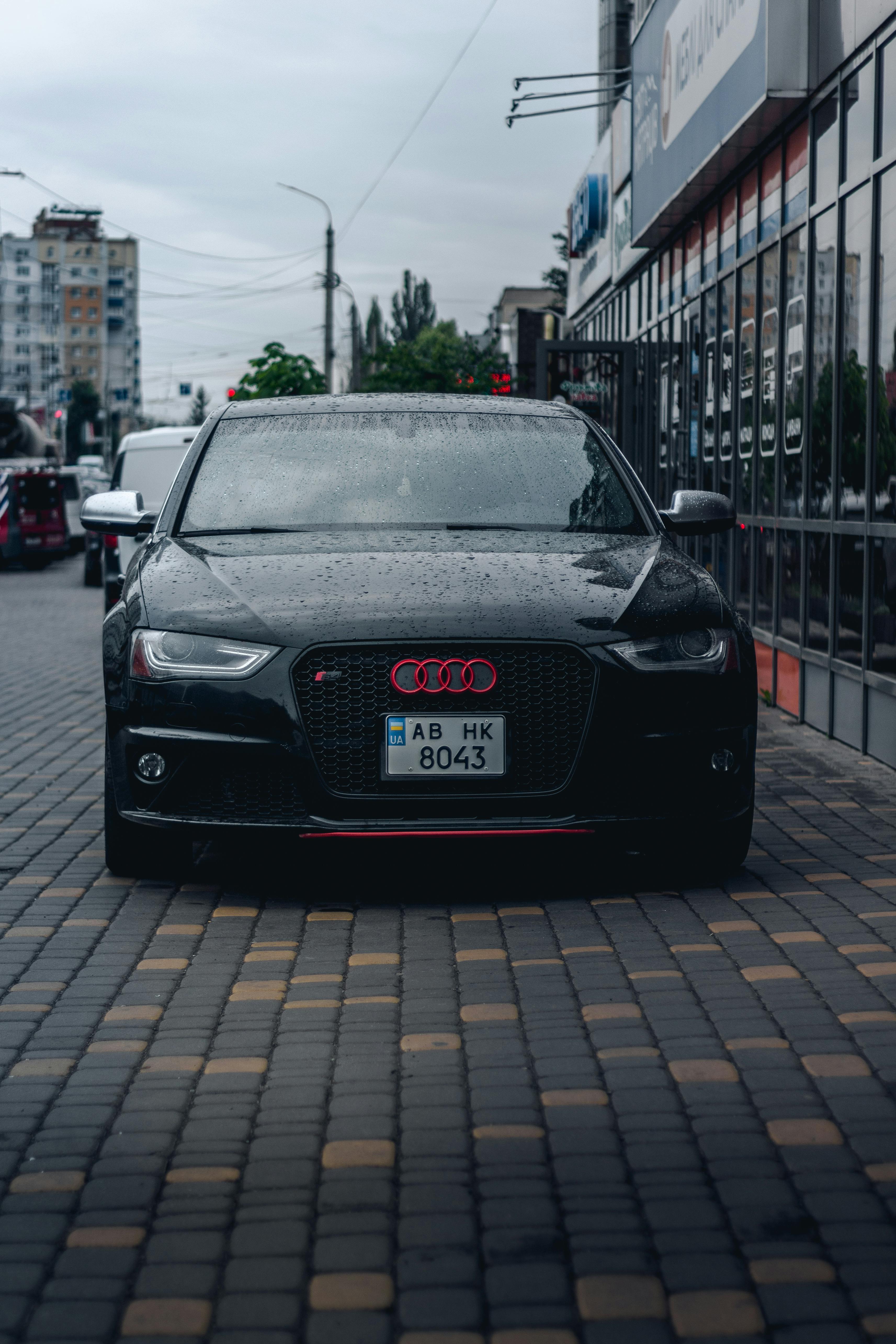 Front View of a Car Parked on Pavement · Free Stock Photo