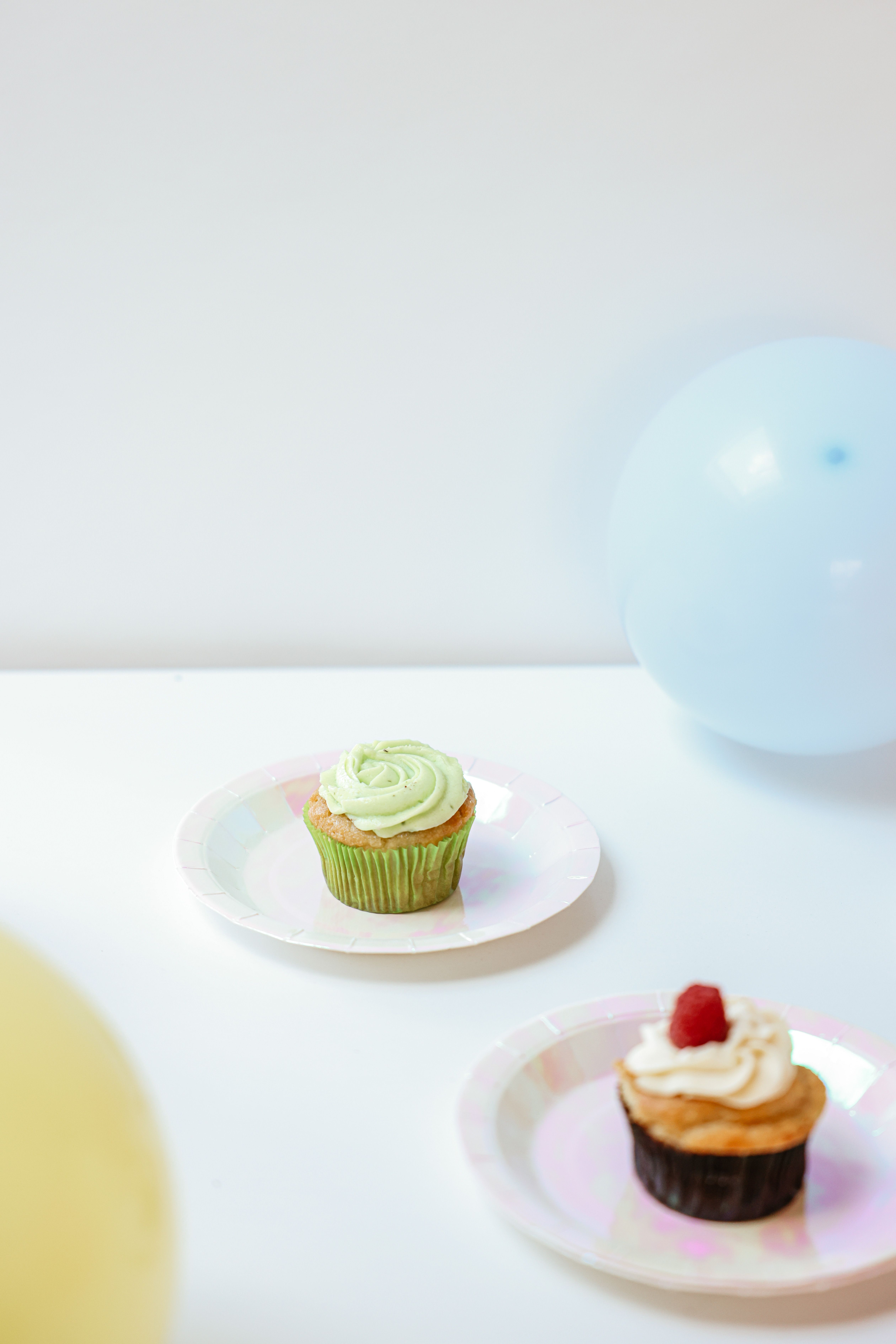Balloons and Cupcakes on White Surface · Free Stock Photo