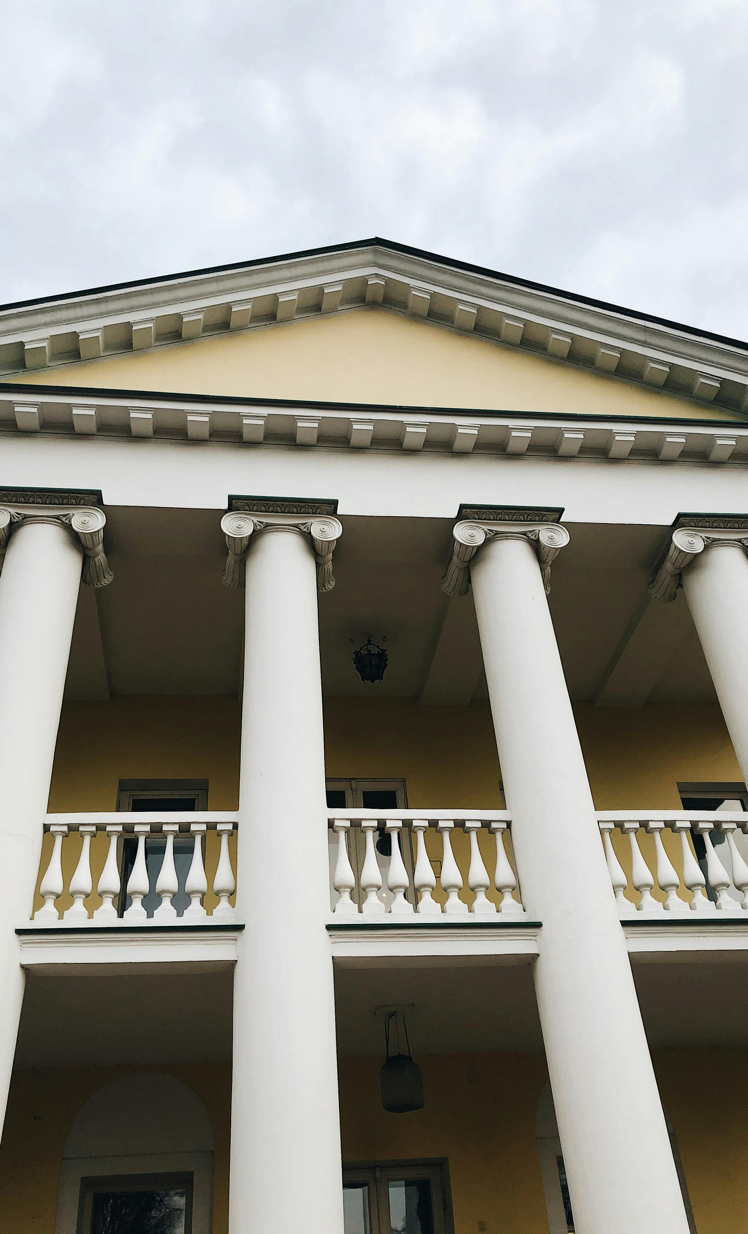 A Building With Columns · Free Stock Photo