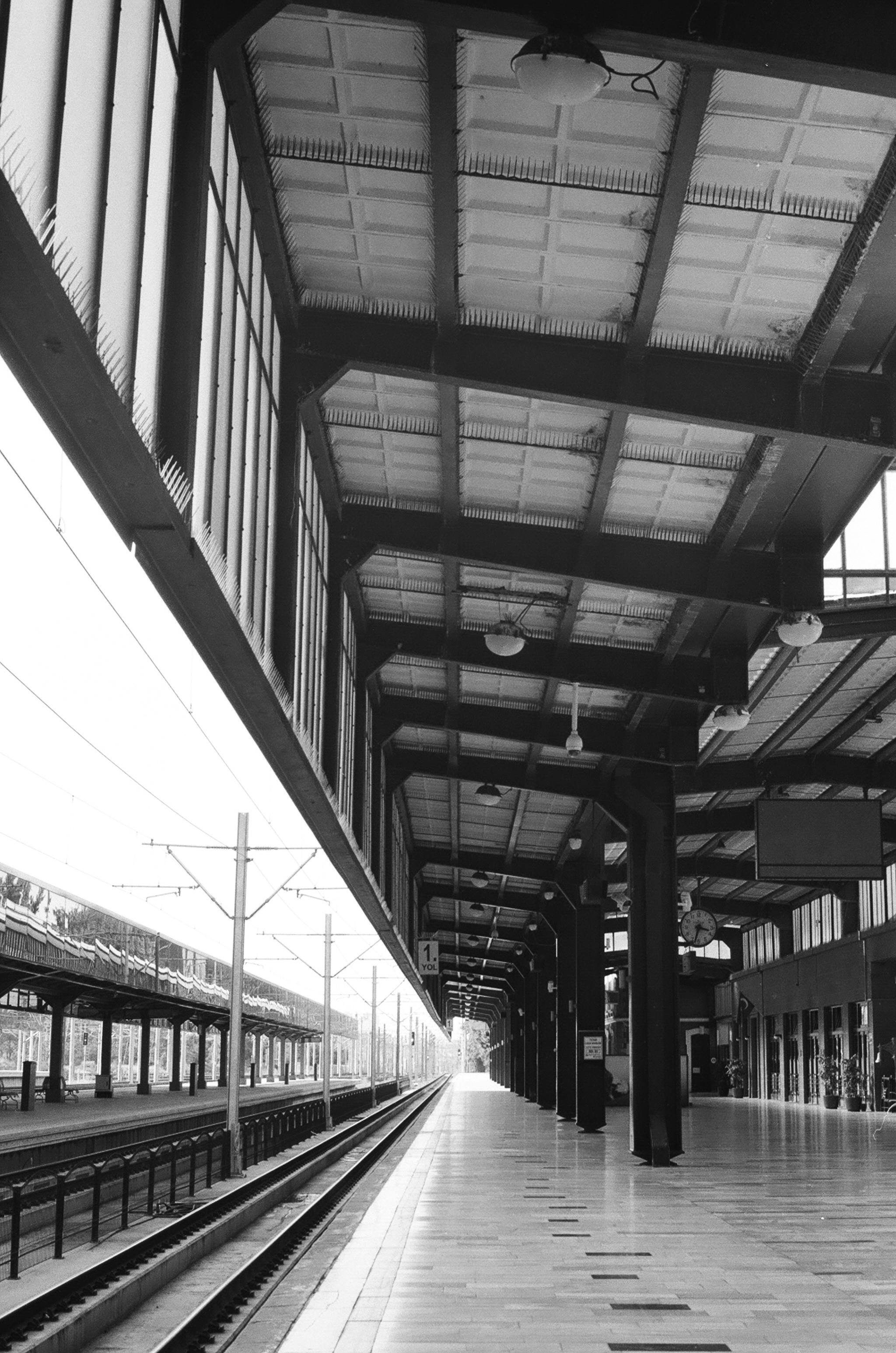 Train Terminal Gray Scale Photo · Free Stock Photo