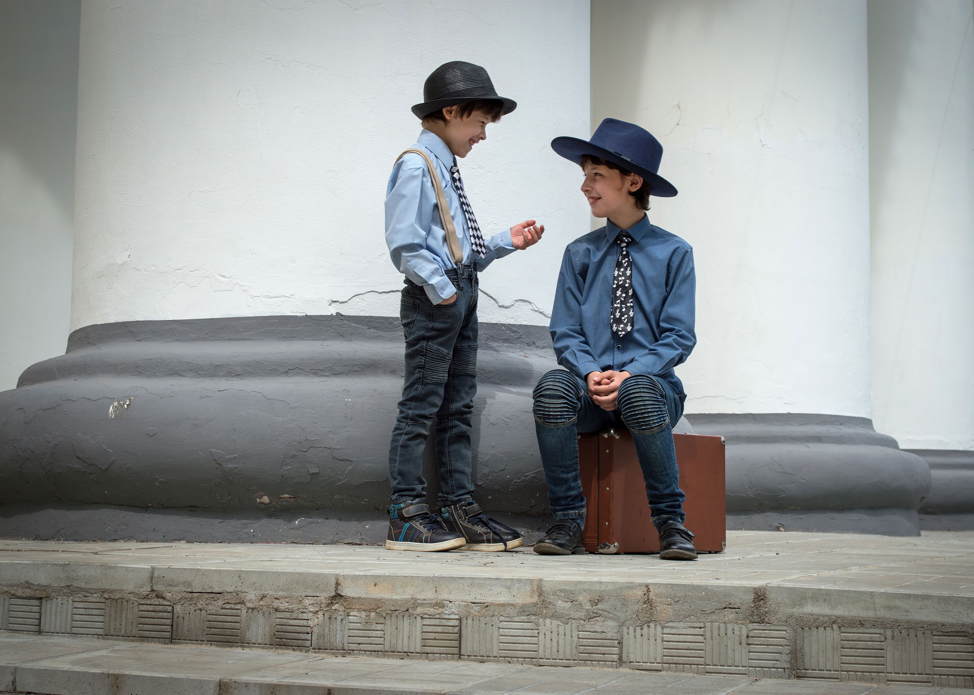 Photograph of Kids with Hats Talking with Each Other · Free Stock Photo